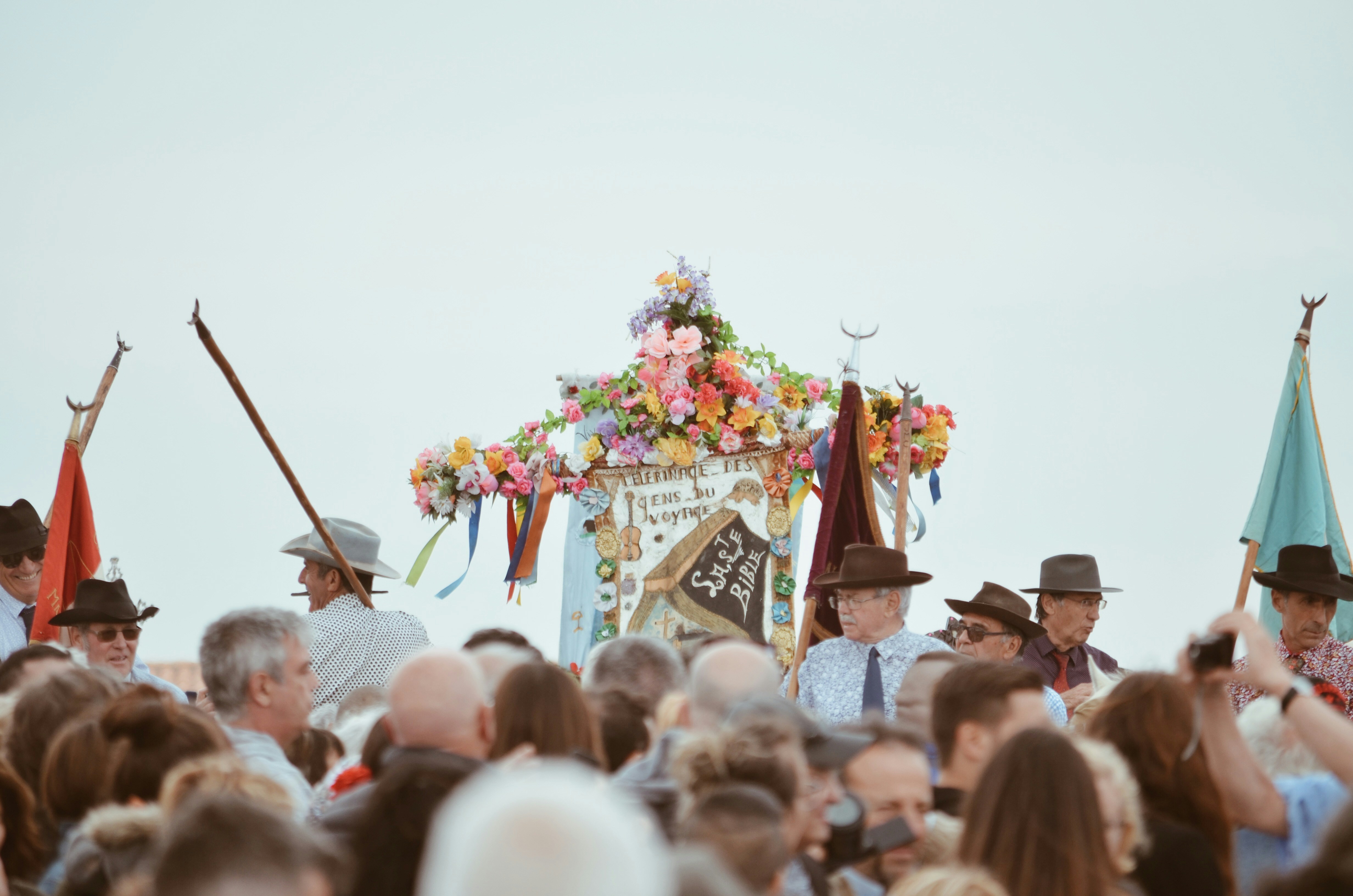 Floral Carriage Rising Above a Sea of Festival Heads