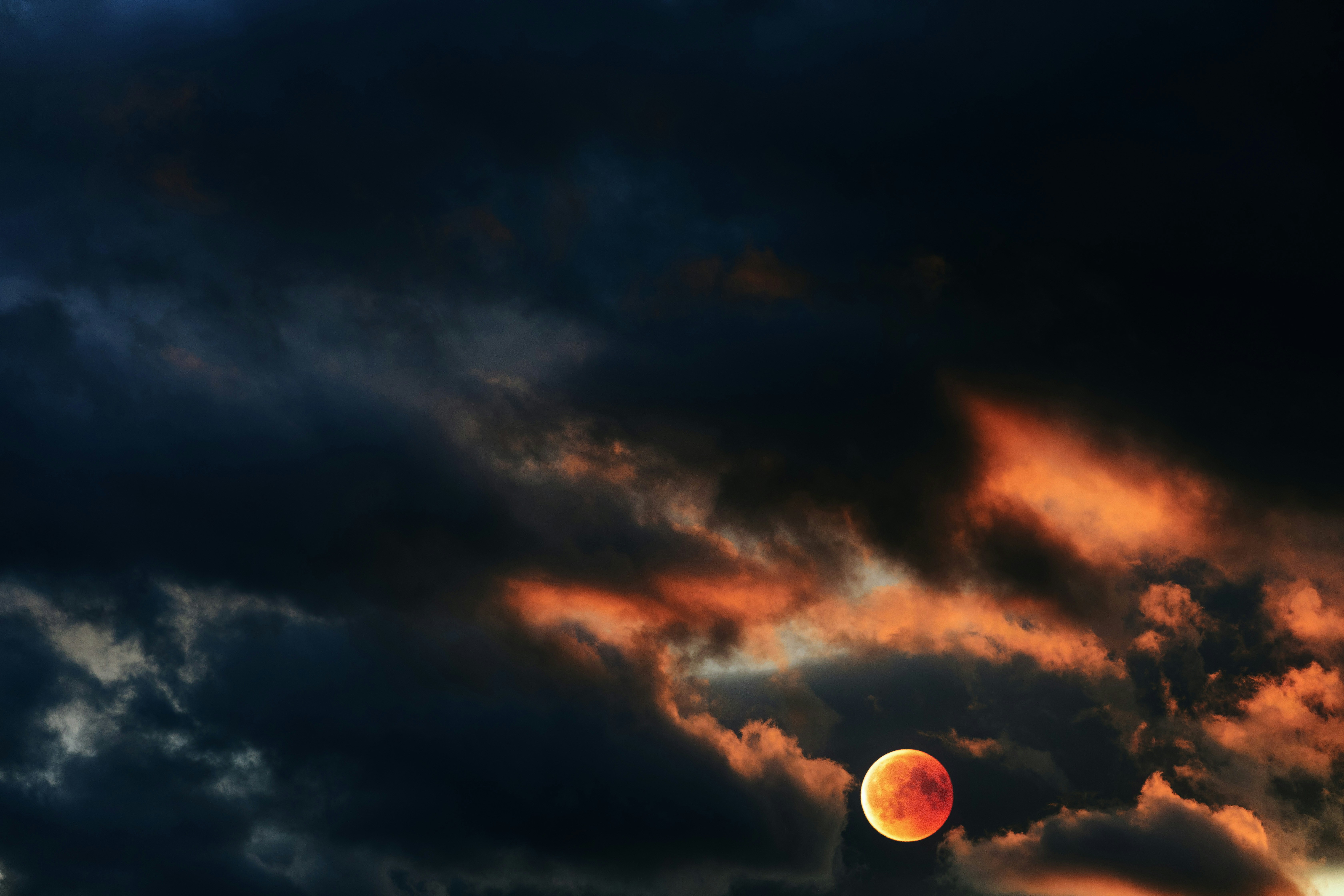 Blood Moon and sunset sky. Dark blue and red clouds, full moon (red and orange). Aesthetic background photo for your website and desighn. | full moon in the sky