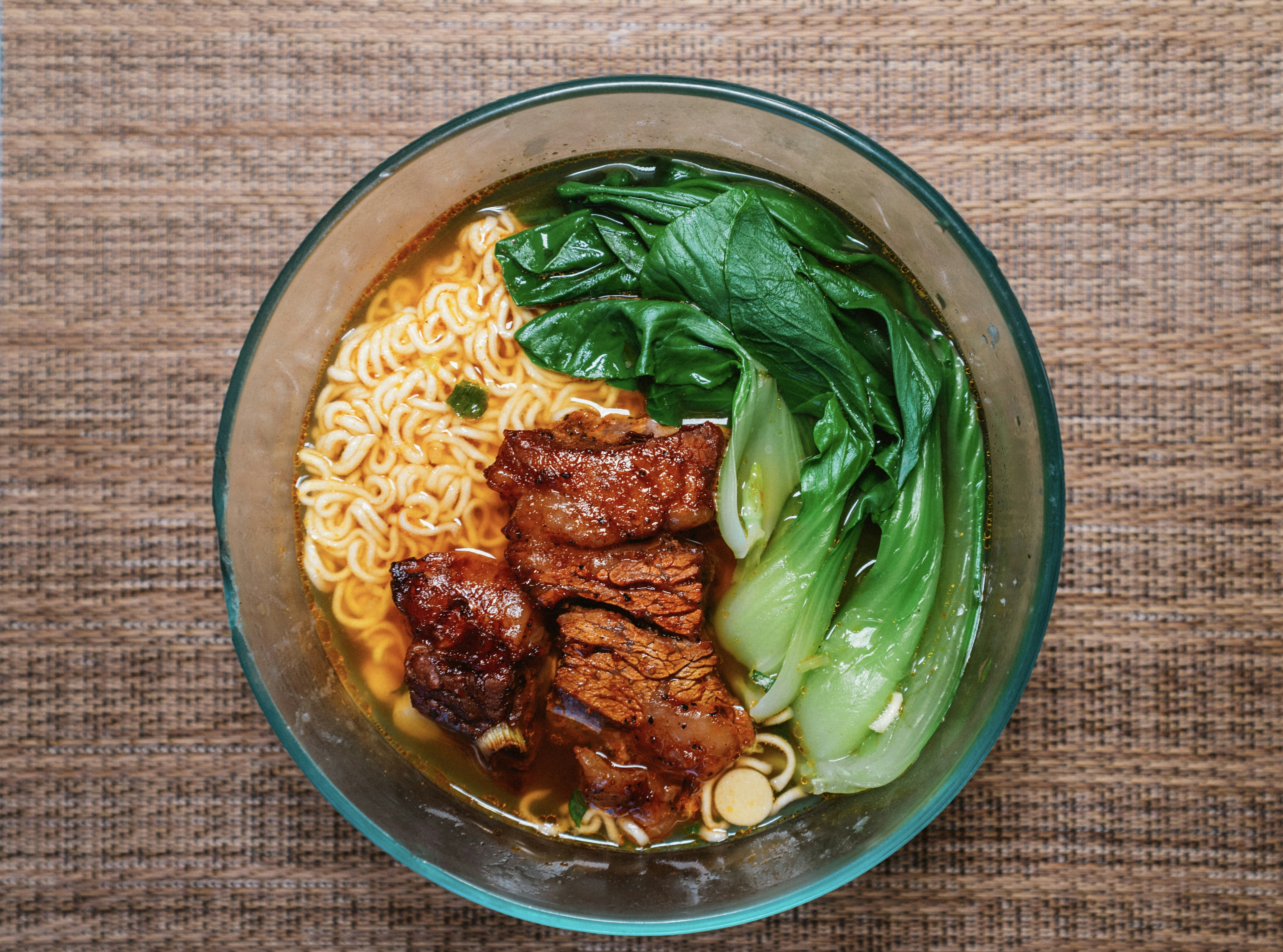 Charred Pork and Emerald Greens Crown a Ramen Bowl