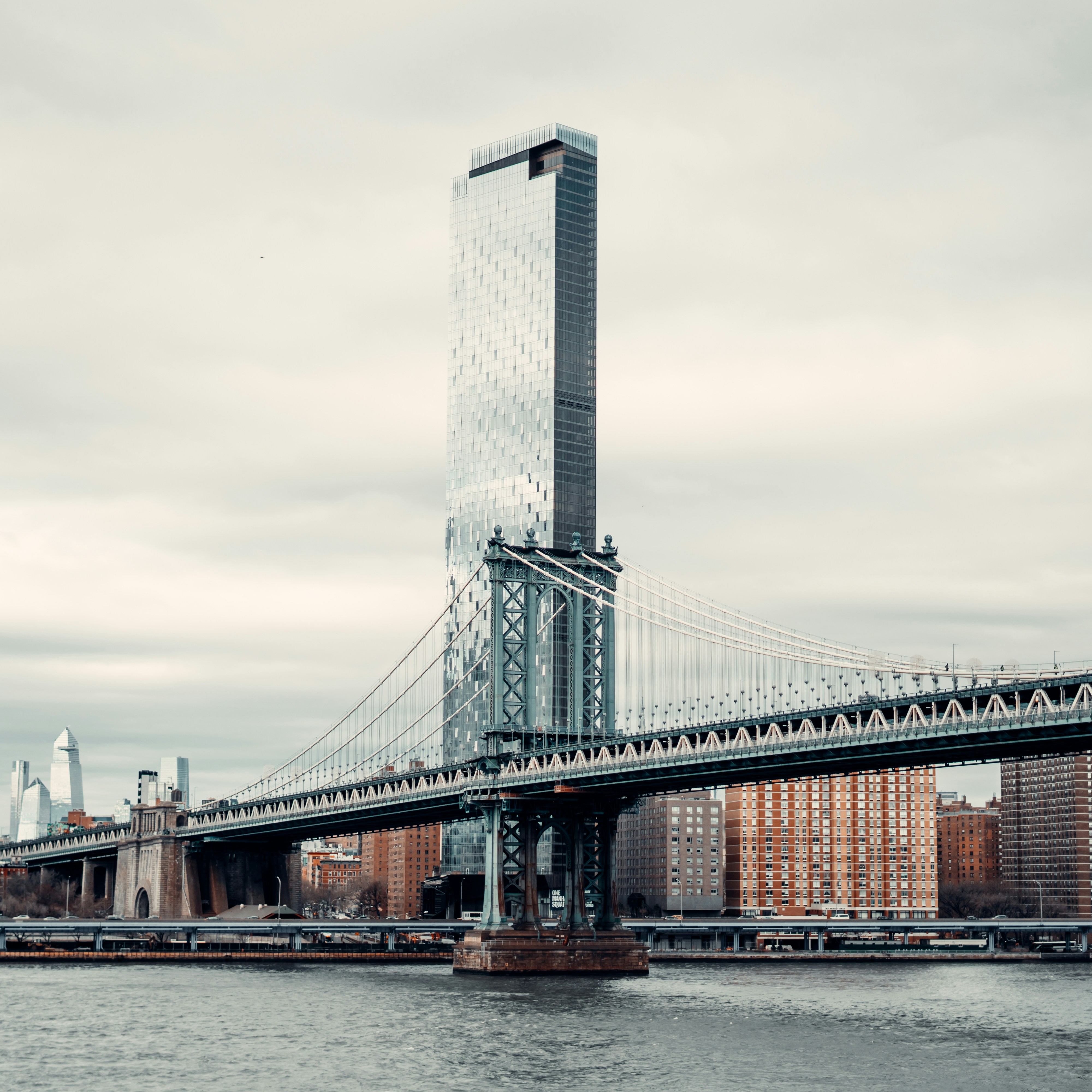 Gray bridge under gray sky photo – Free Building Image on Unsplash