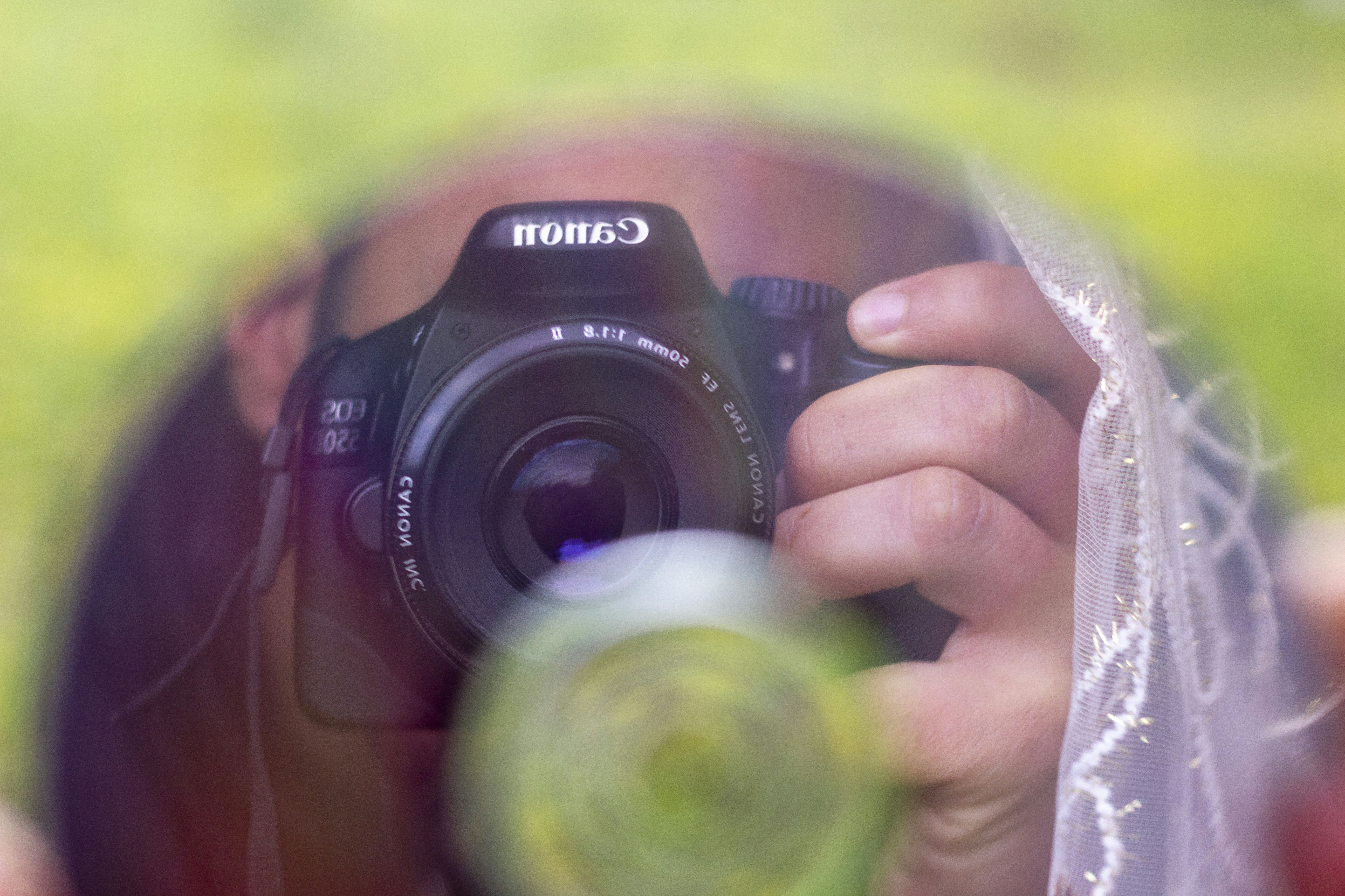 Behind the Glass: A Quiet Portrait Through a Reflective Lens