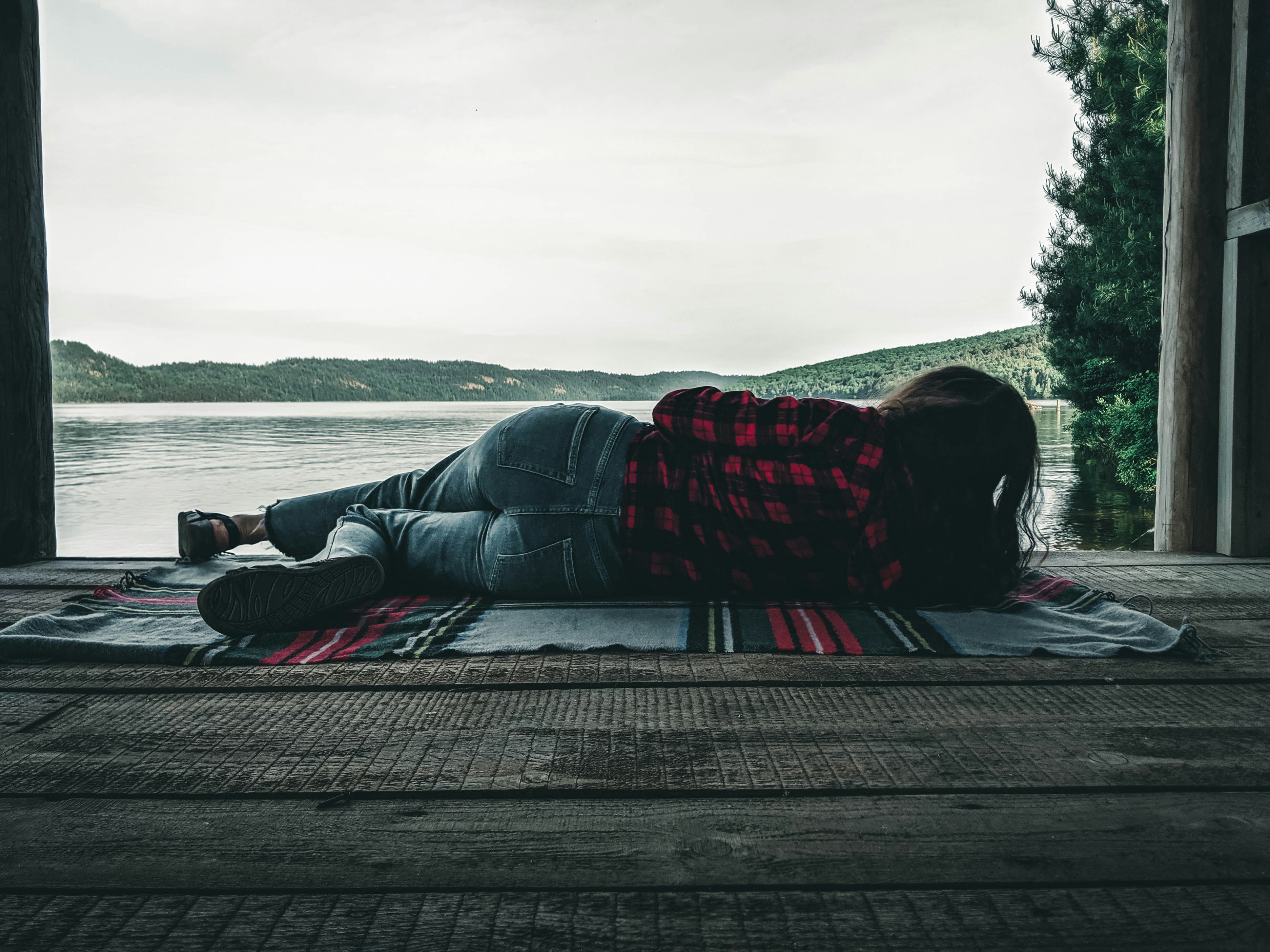 Lying by the Lake: A Quiet Moment on the Dock