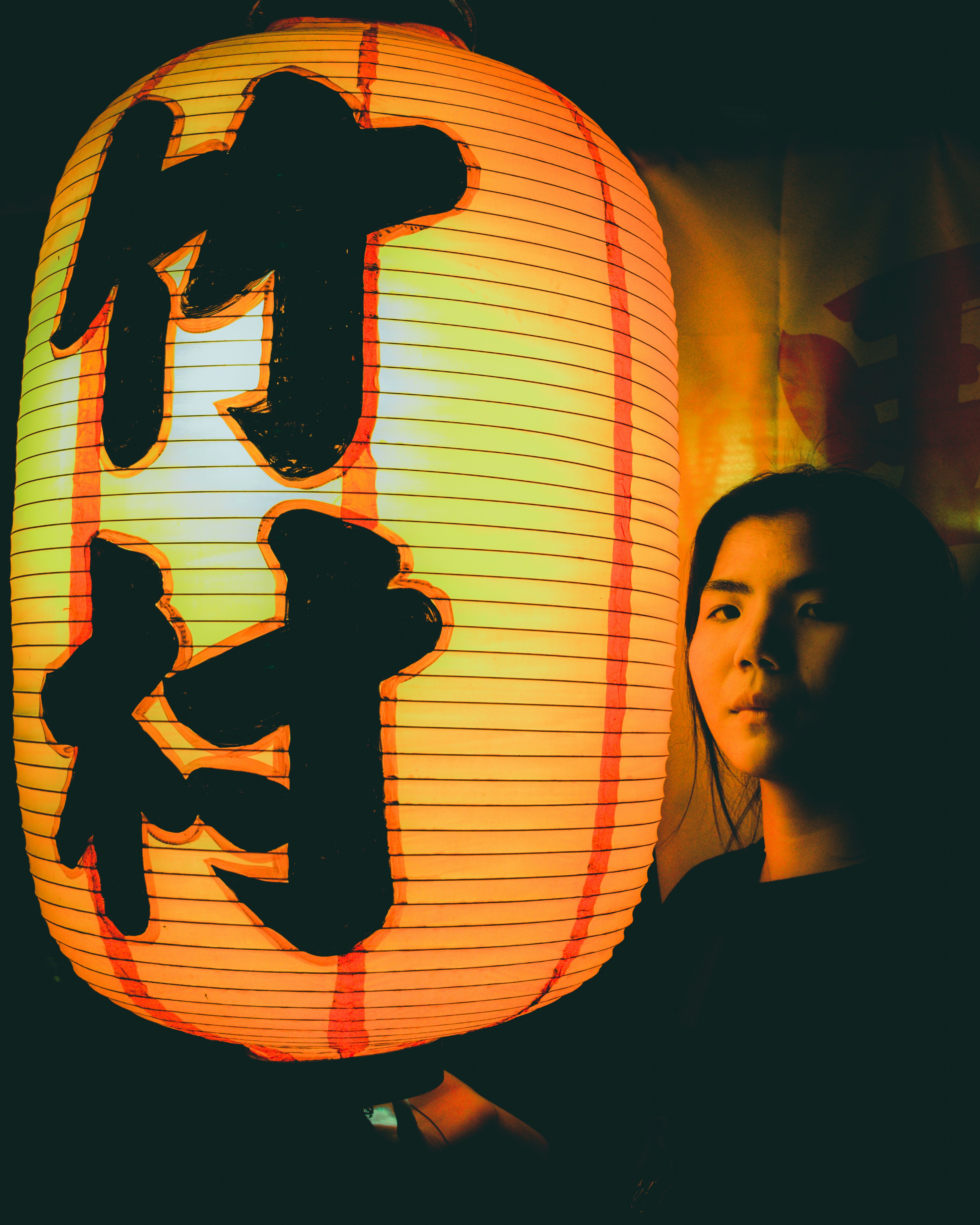 Red Lantern Pulse: A Quiet Portrait in Festival Glow