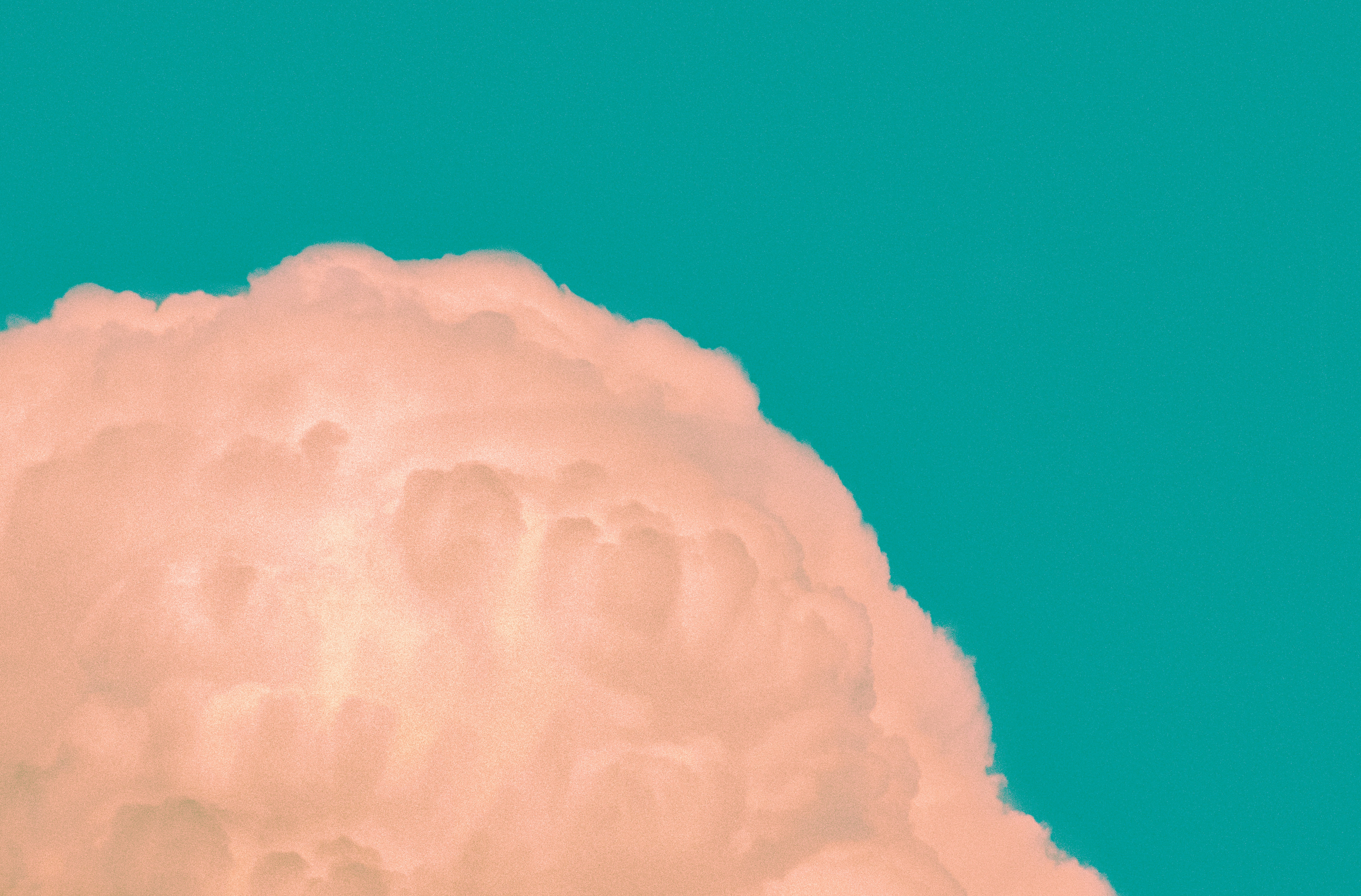 Cloud Burst over Teal Sky