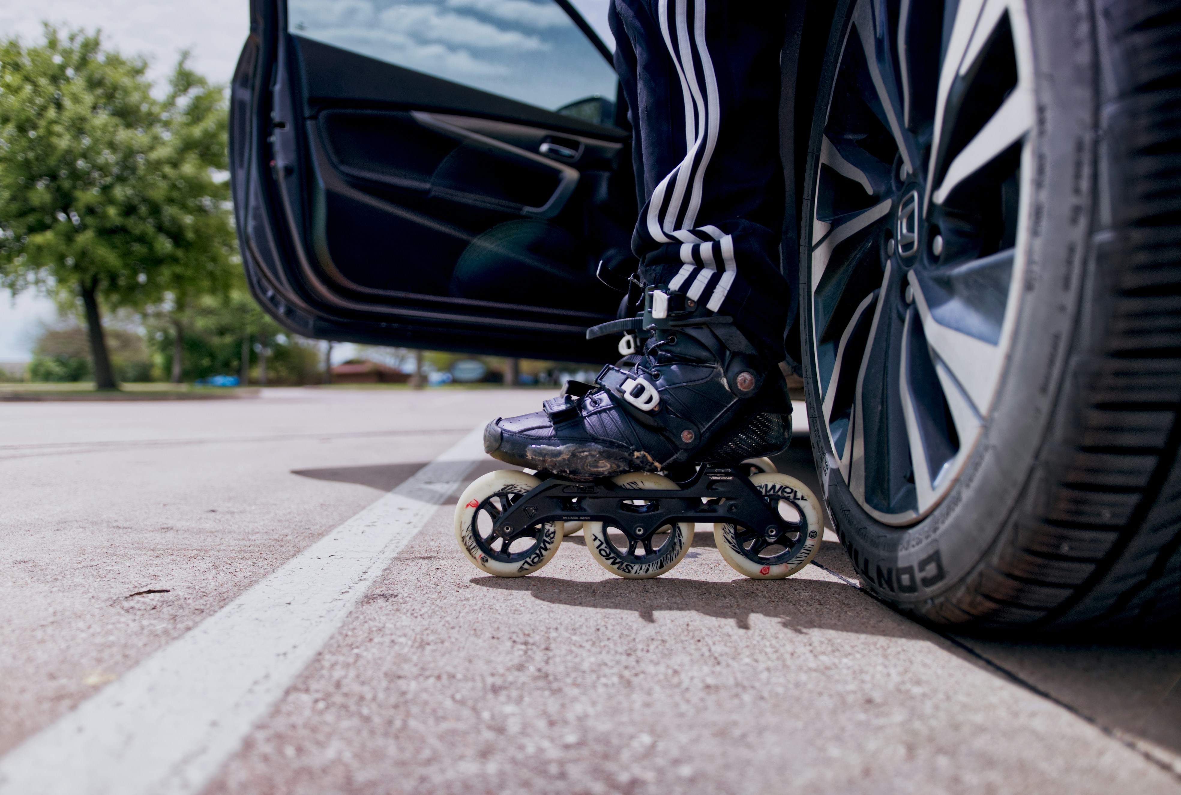 Roll-on Ready: A Skate-Track Moment by the Open Car Door