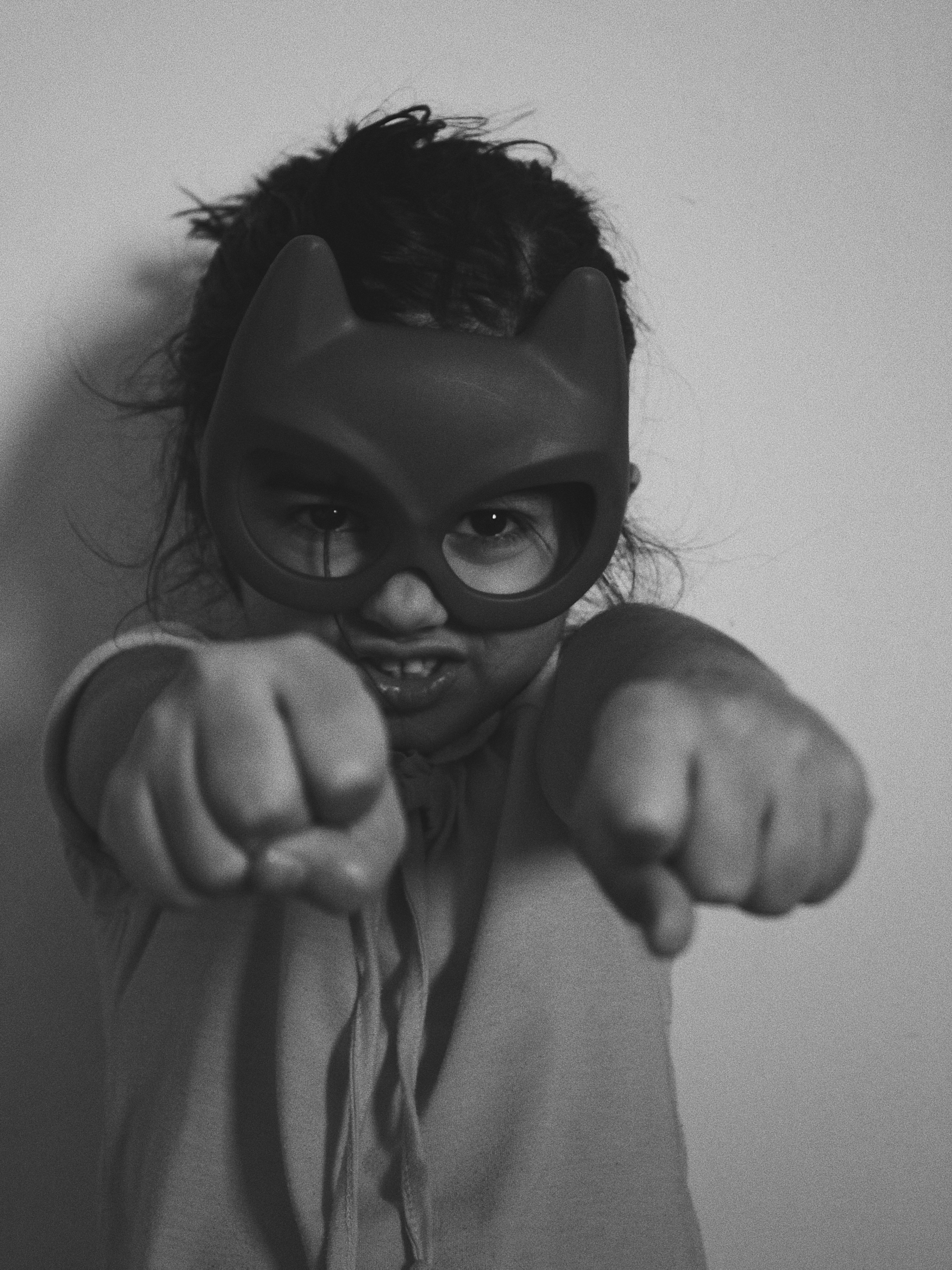 Heroic Front Fists: A Playful Masked Moment