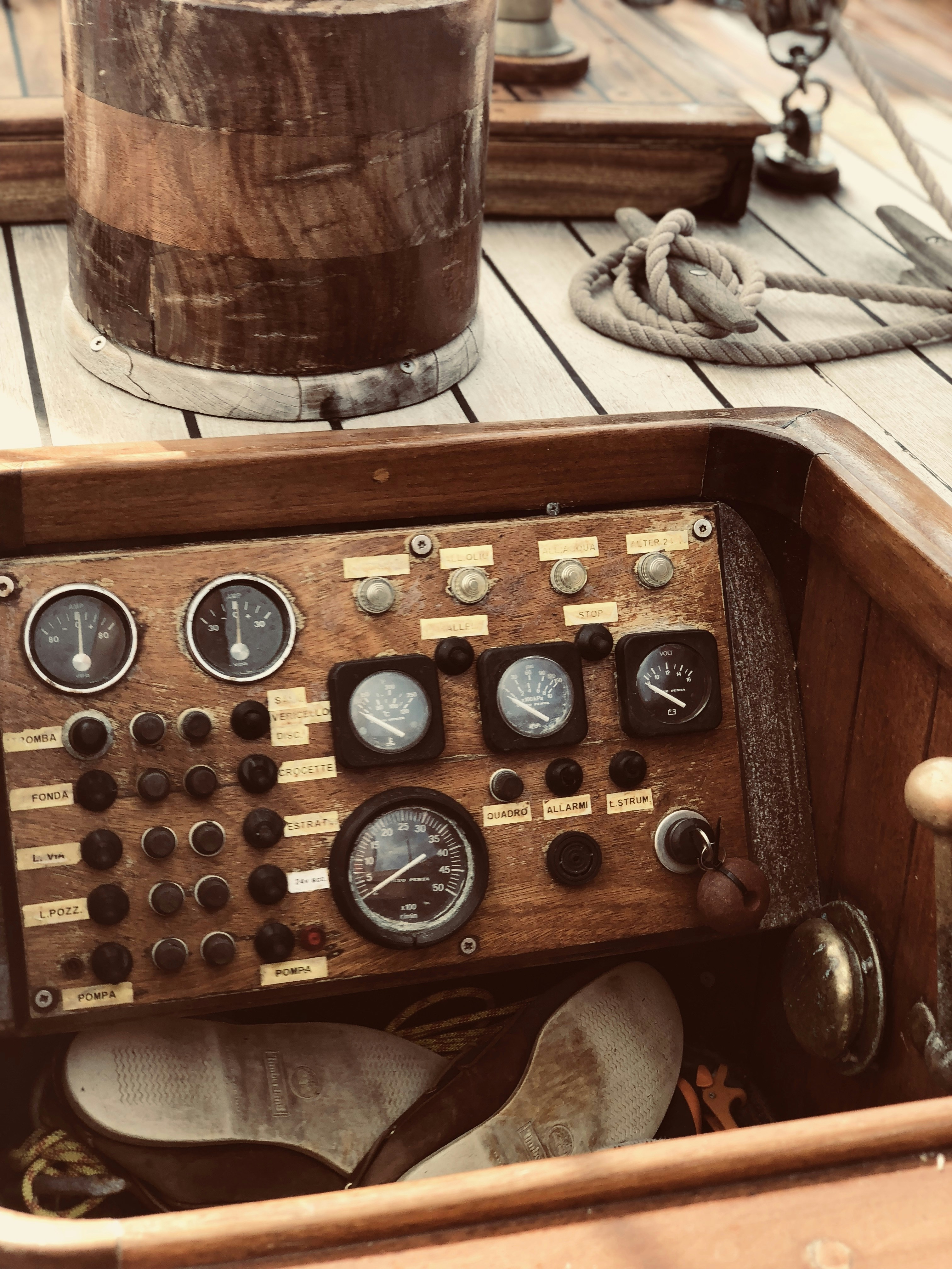 brown and white wooden analog device