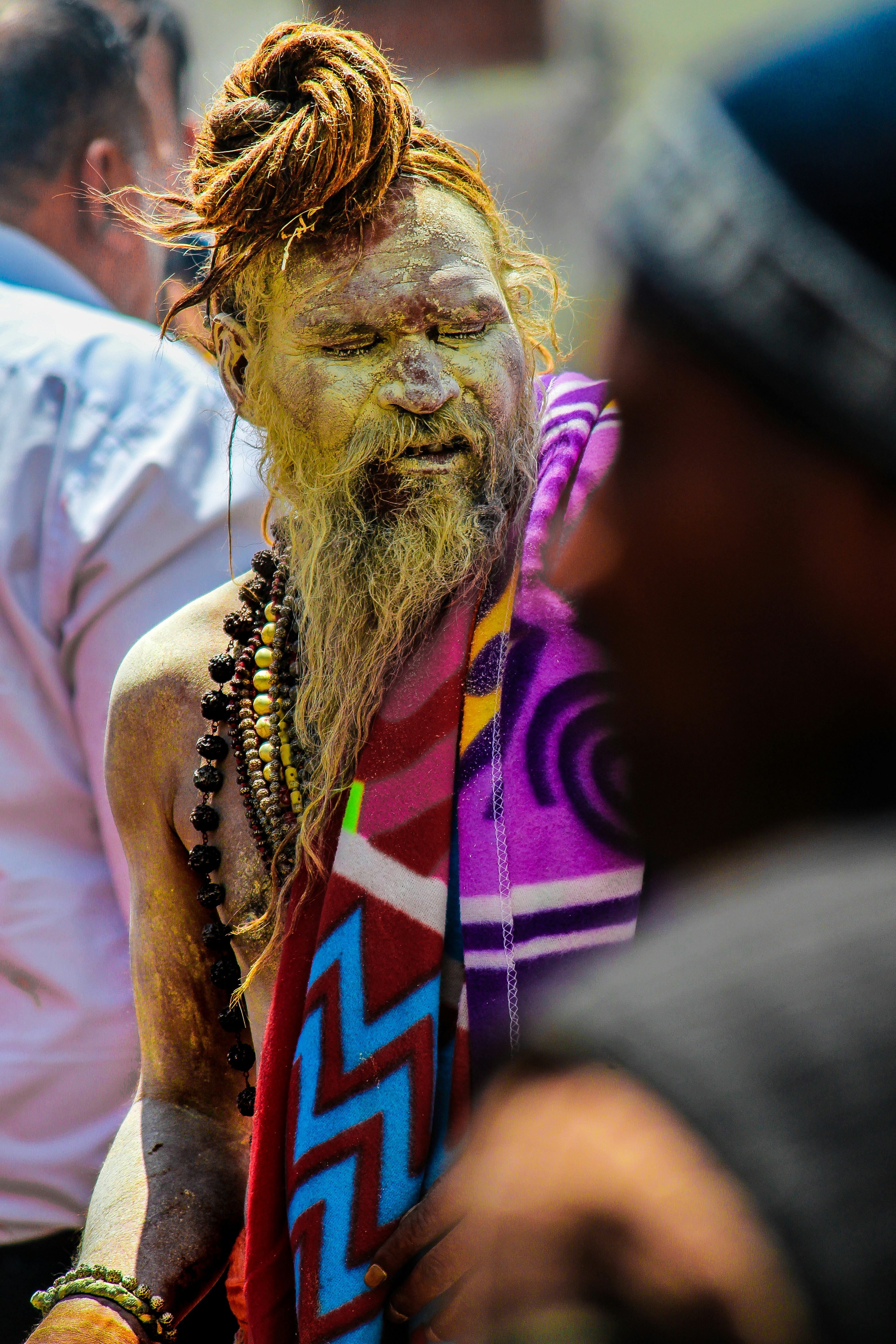 Golden Dust Portrait at a Colorful Festival