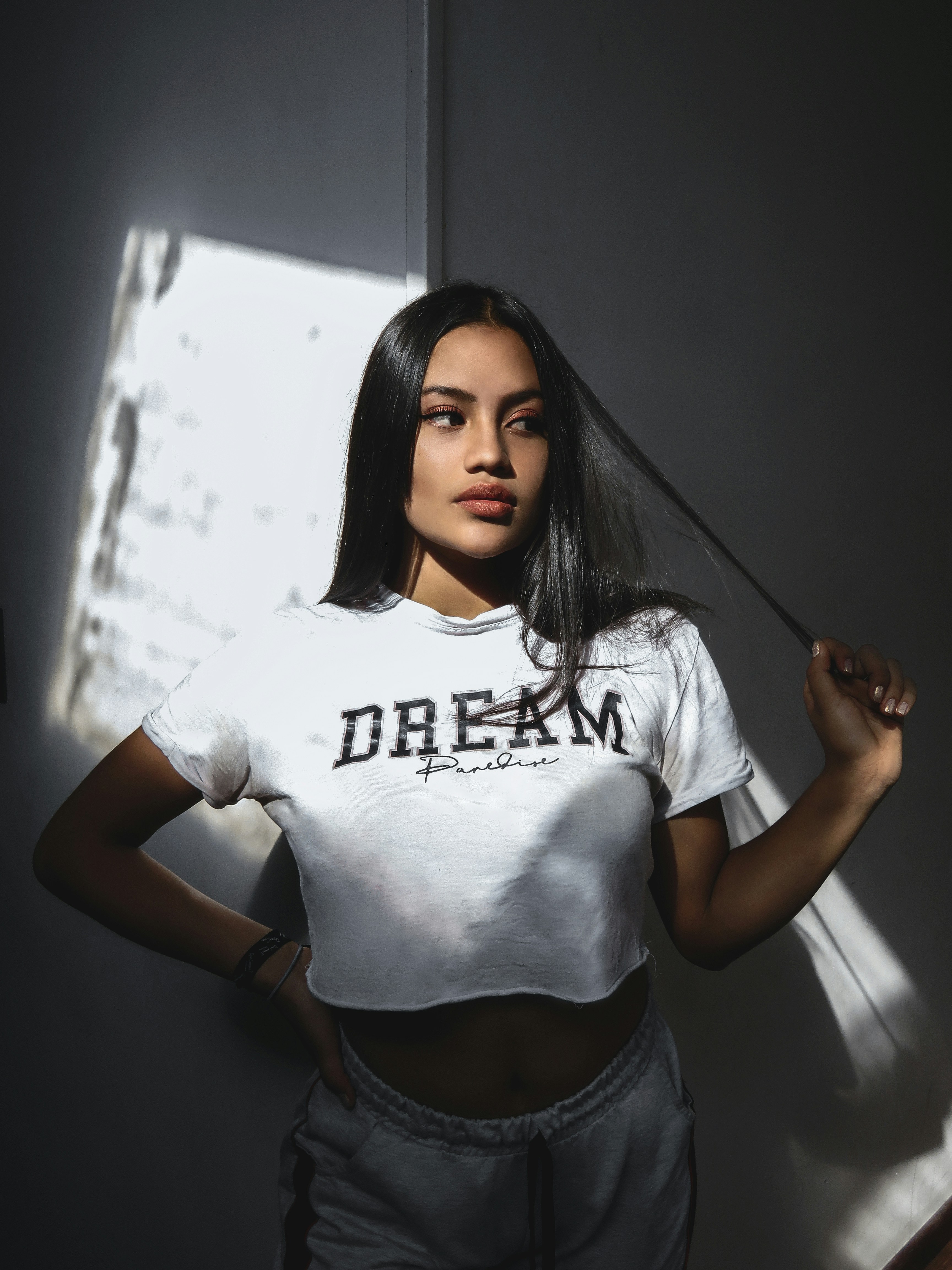Portrait in Shadow and Light: A Quiet Confidence in White