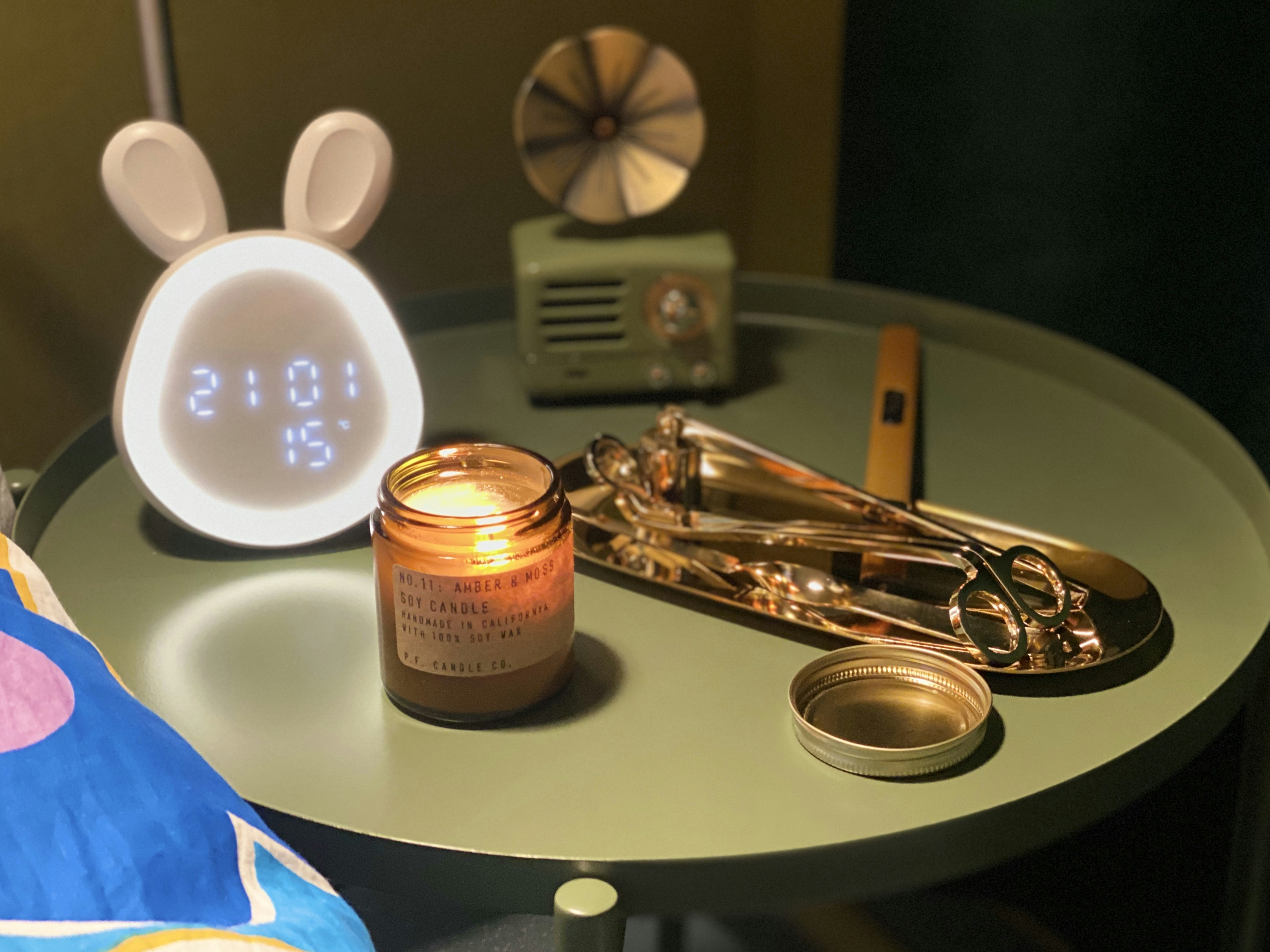 Glowing Bunny Clock and Candlelit Tools on a Mint Round Table