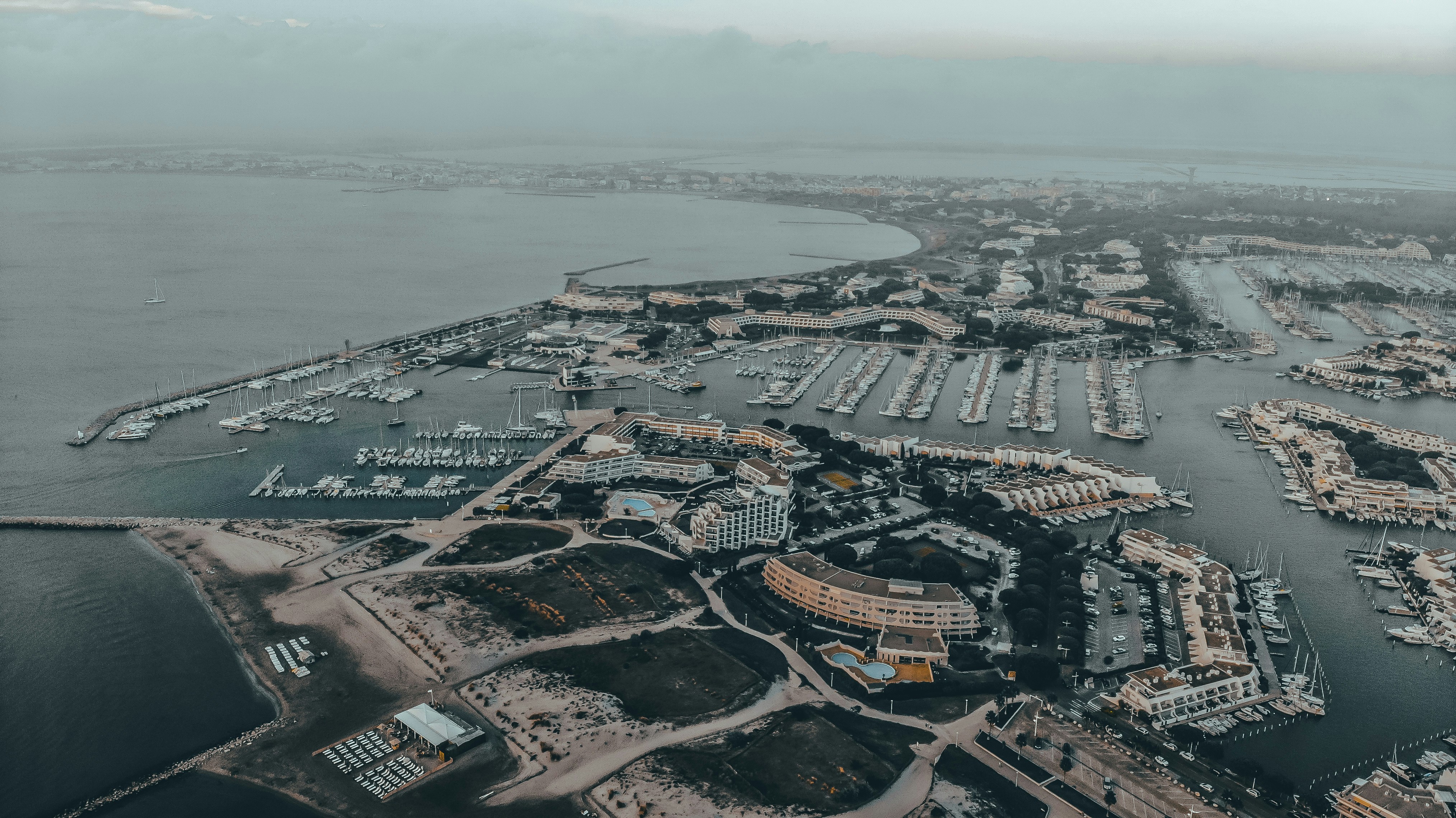 Marina Crest: Aerial Confluence of Docks and Villages