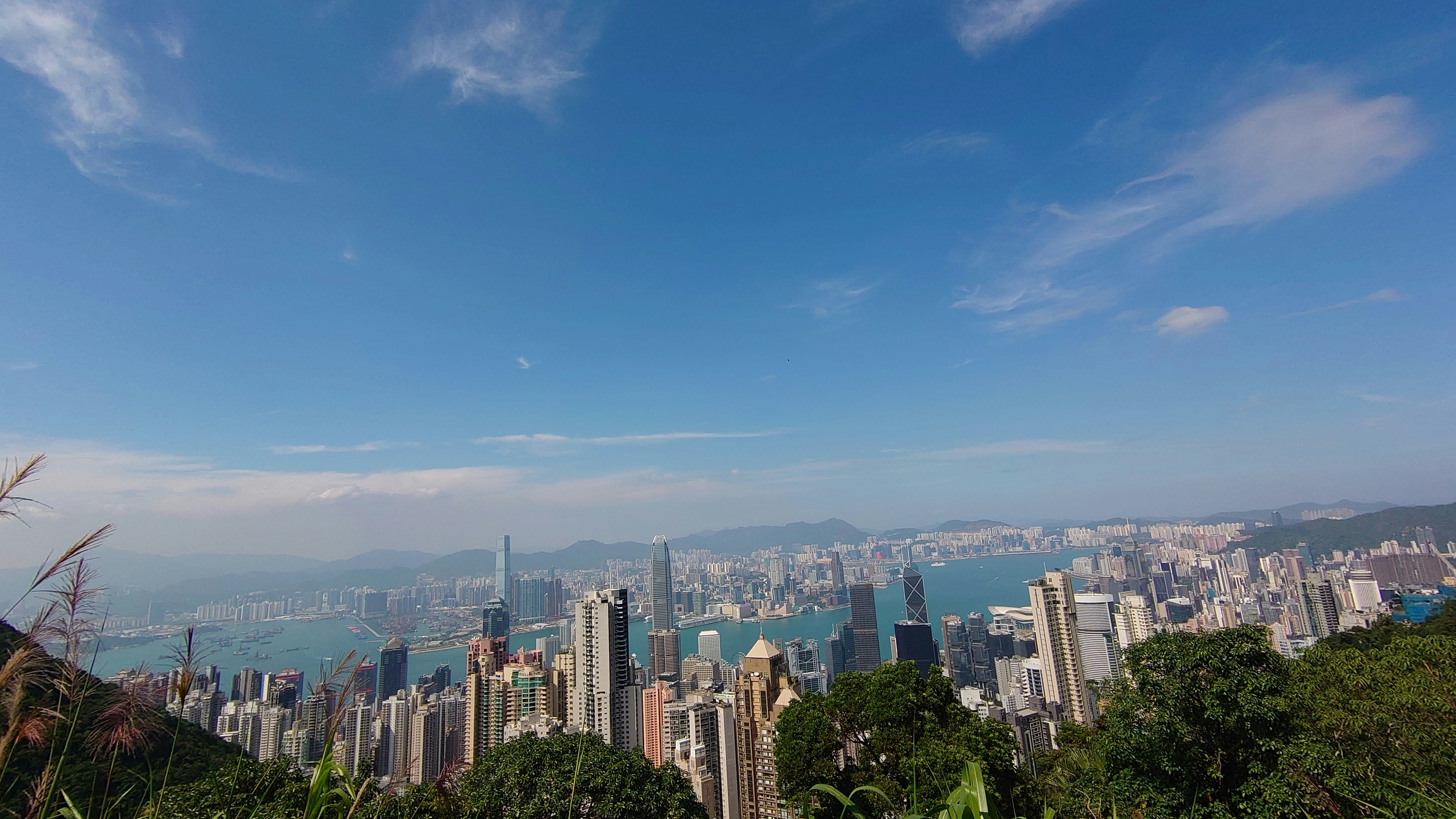 city skyline under blue sky during daytime