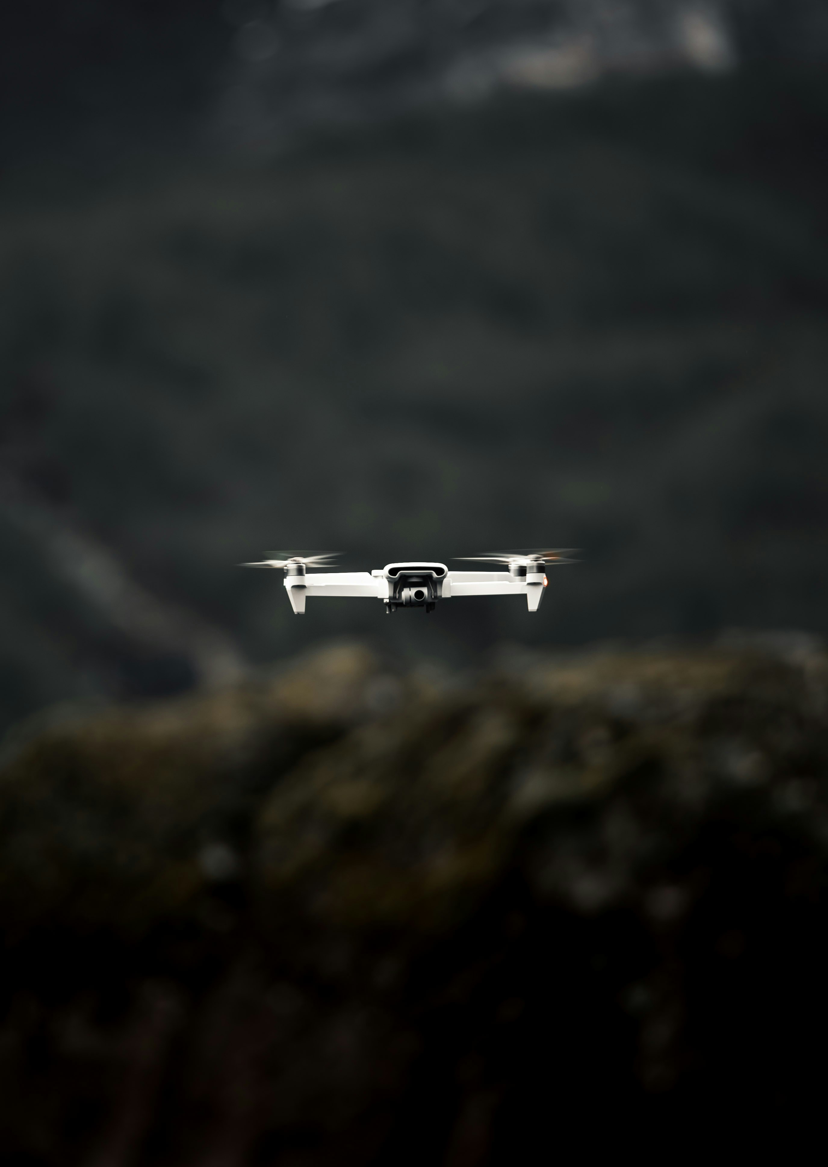 White drone flying over the mountain photo – Free Grey Image on Unsplash