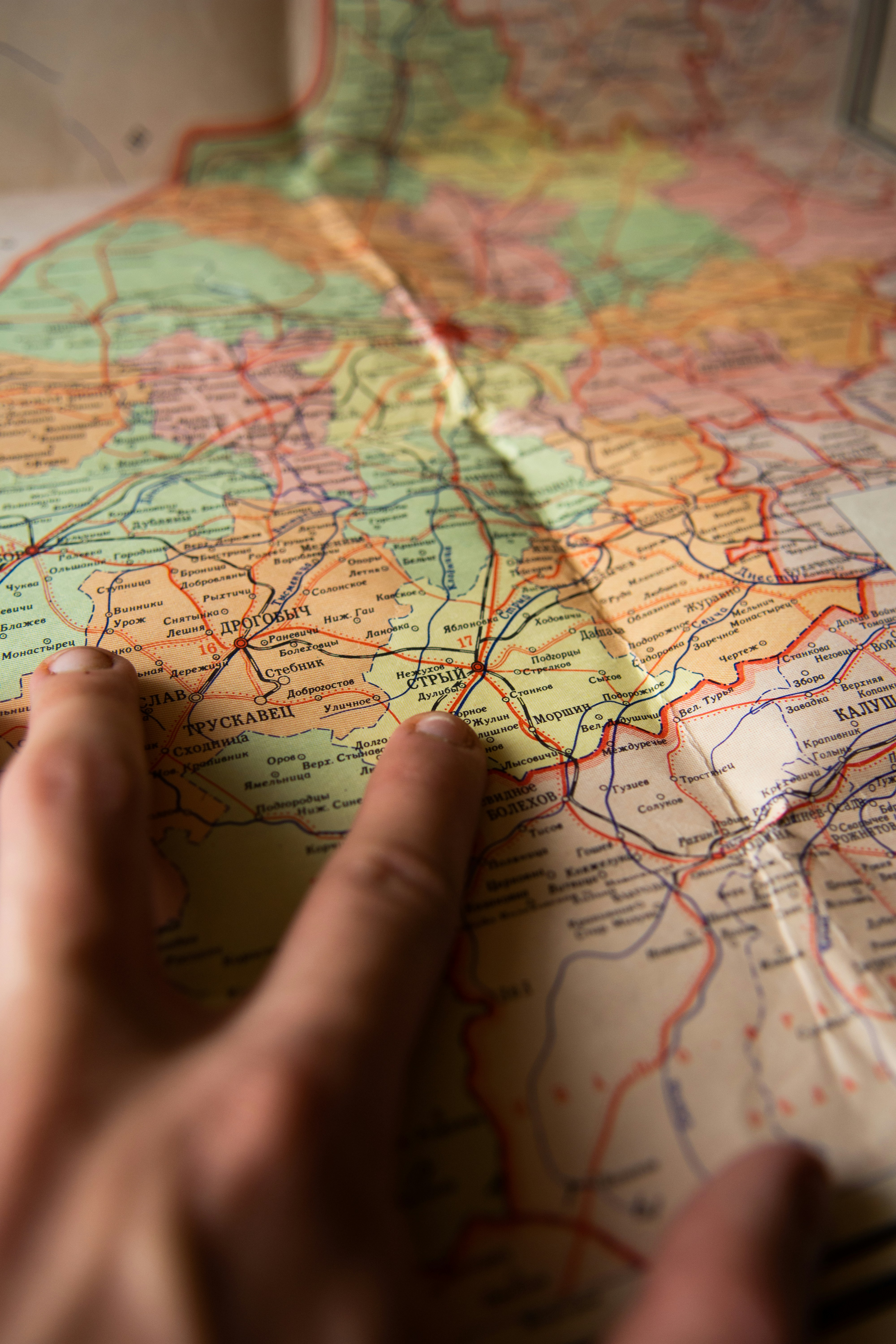 Persons left hand on map photo – Free Human Image on Unsplash