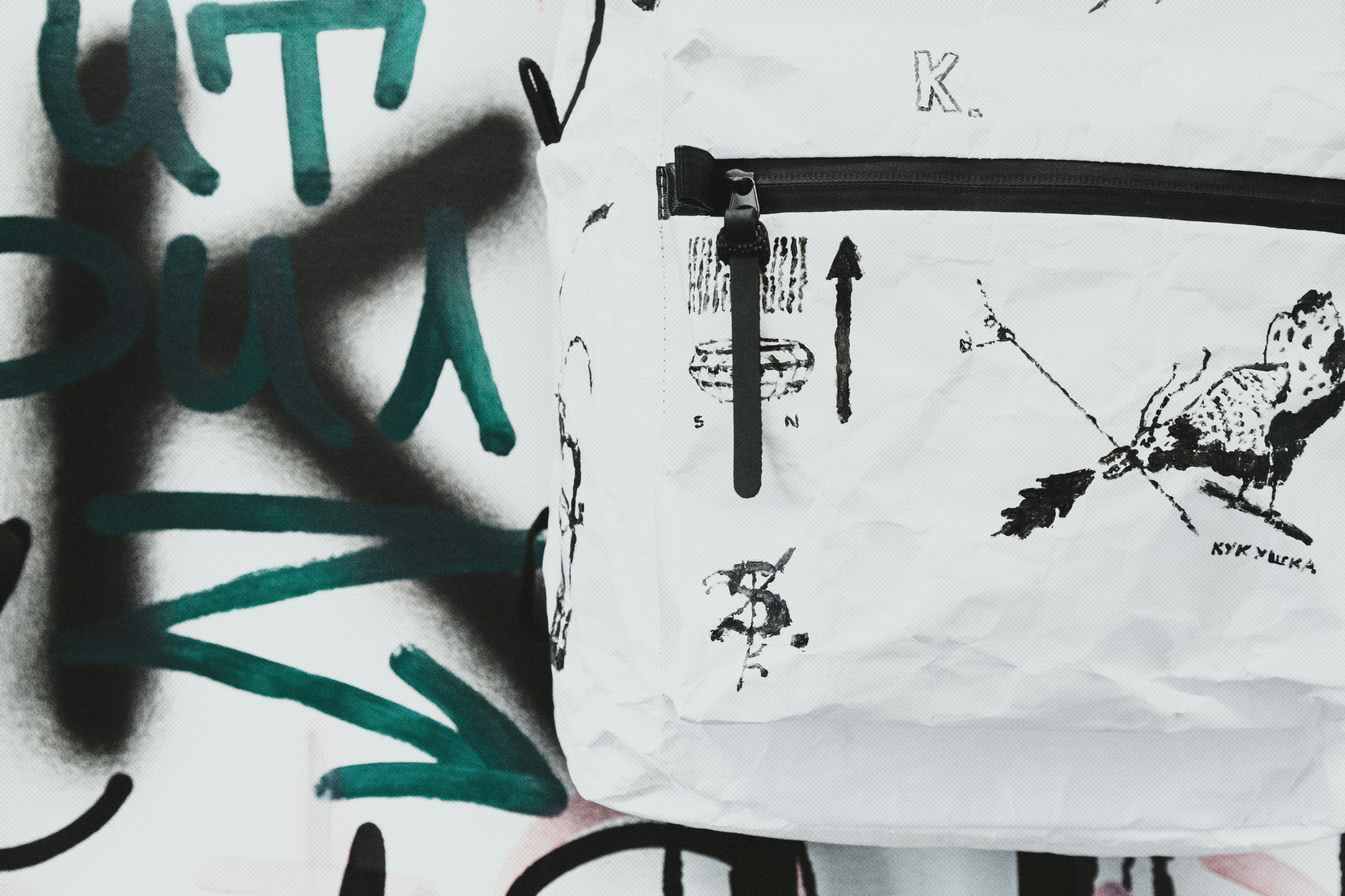 Graffiti-etched Mailbox: Urban Texture in Motion