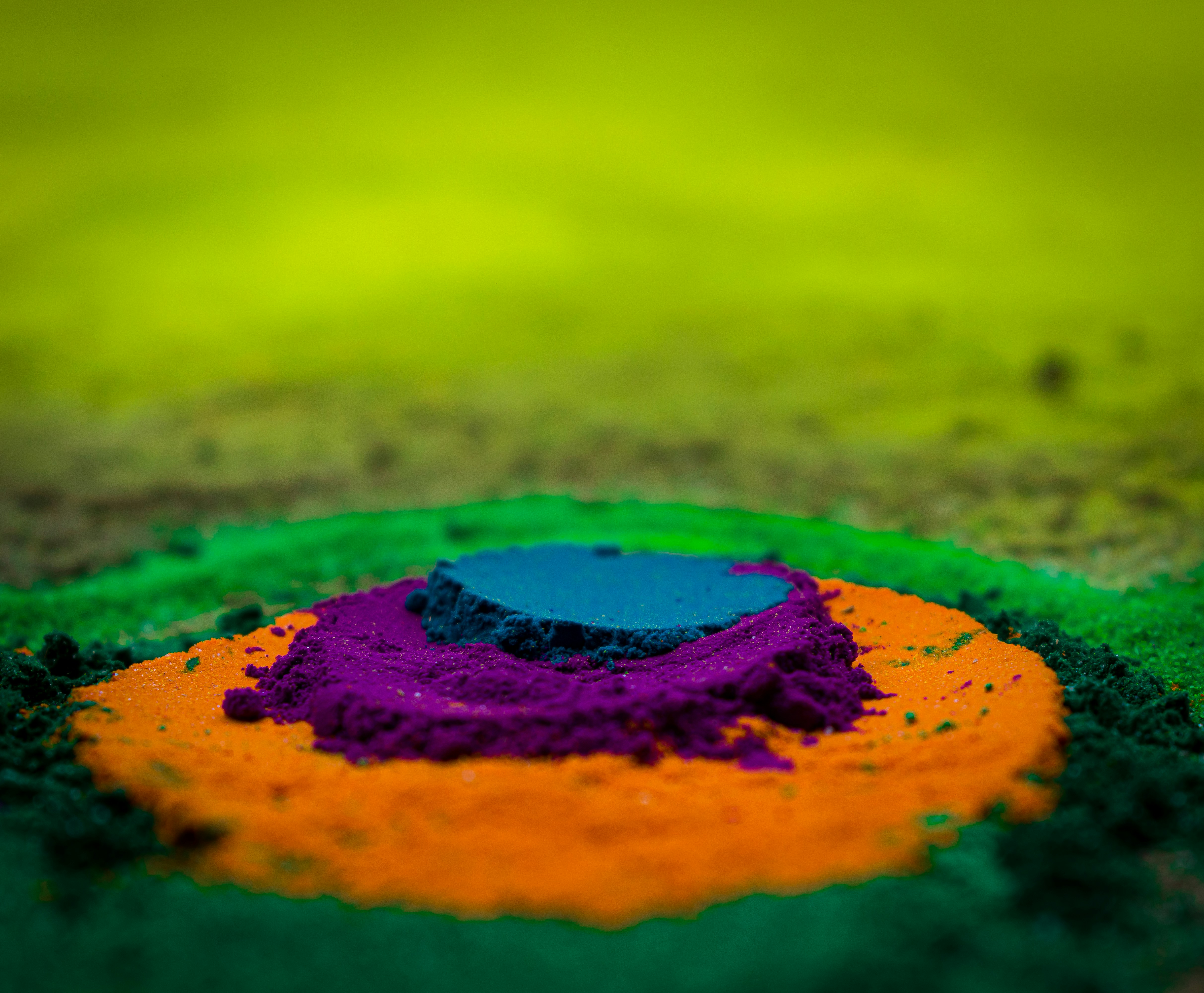 Concentric Rainbow on the Ground: A Close-Up of Powdered Color Rings