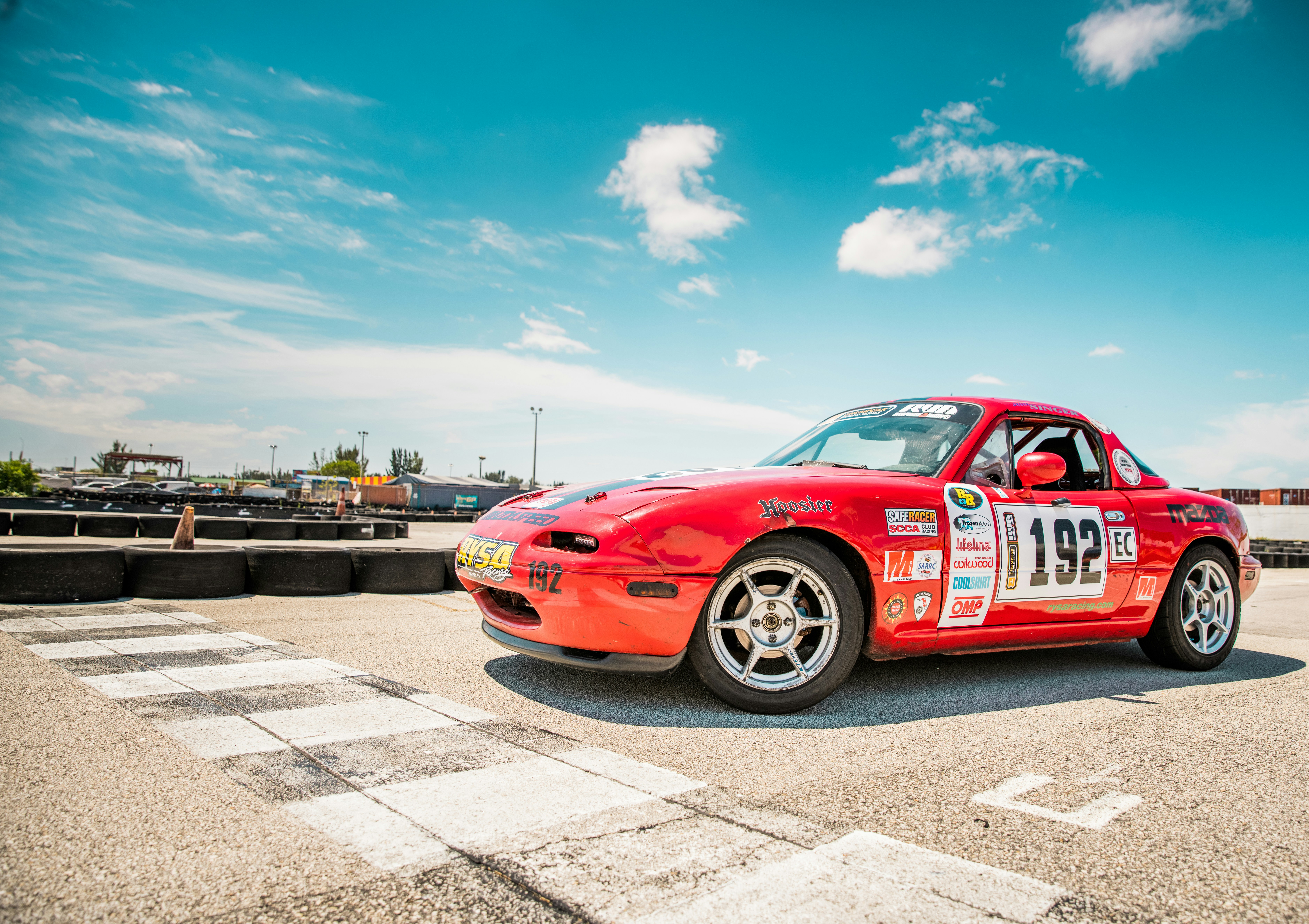 Red porsche 911 parked on parking lot during daytime photo – Free ...