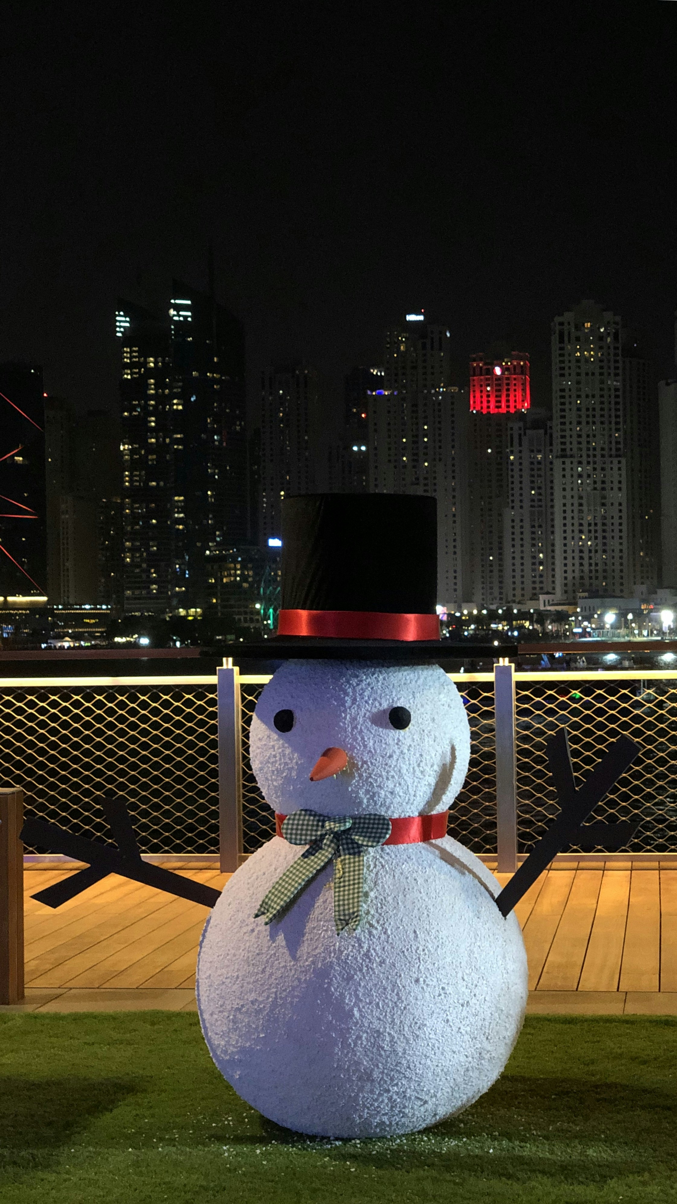 White and red snowman plush toy on brown wooden chair photo – Free ...