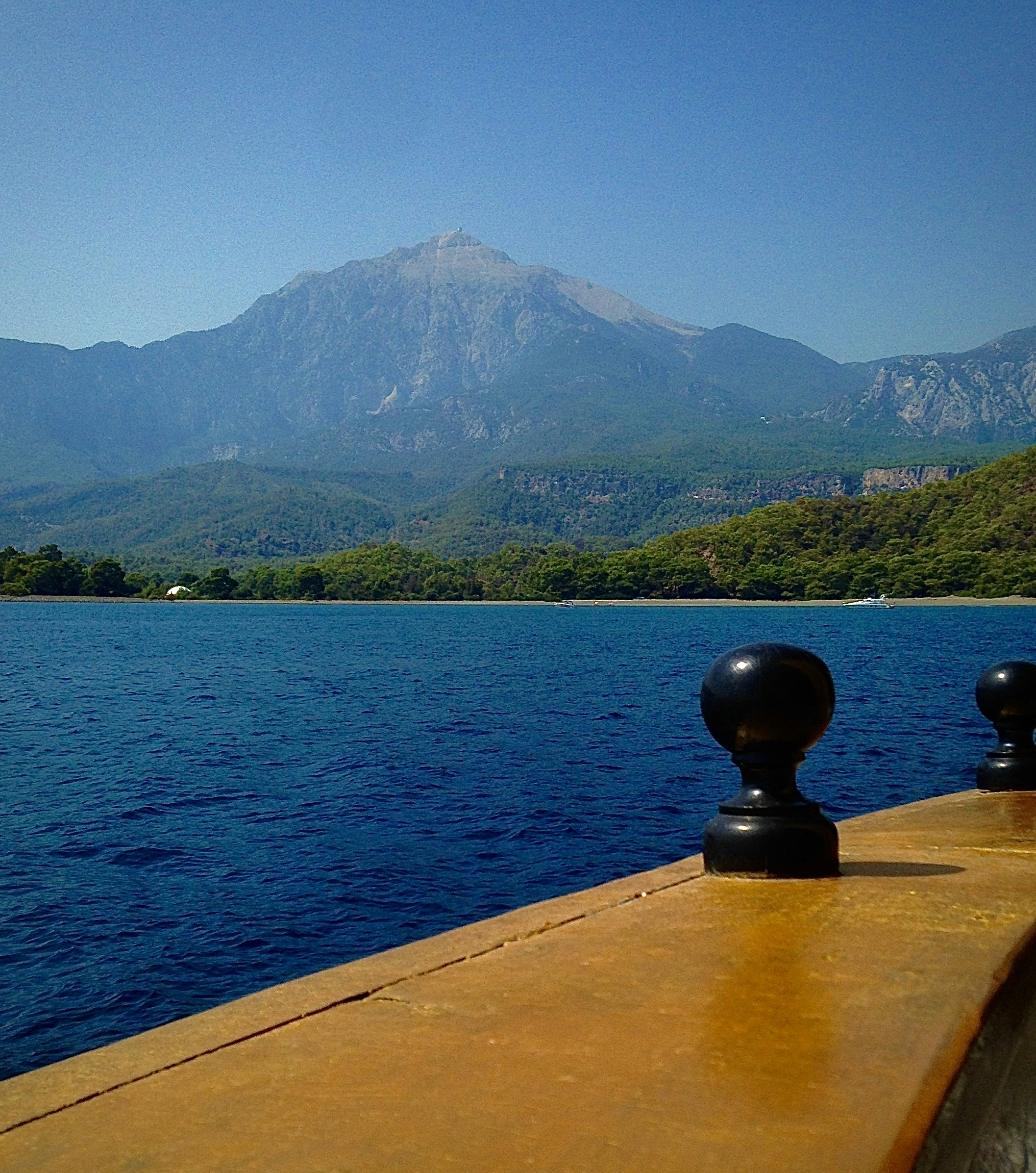 Azure Lakefront with Mountain Backdrop