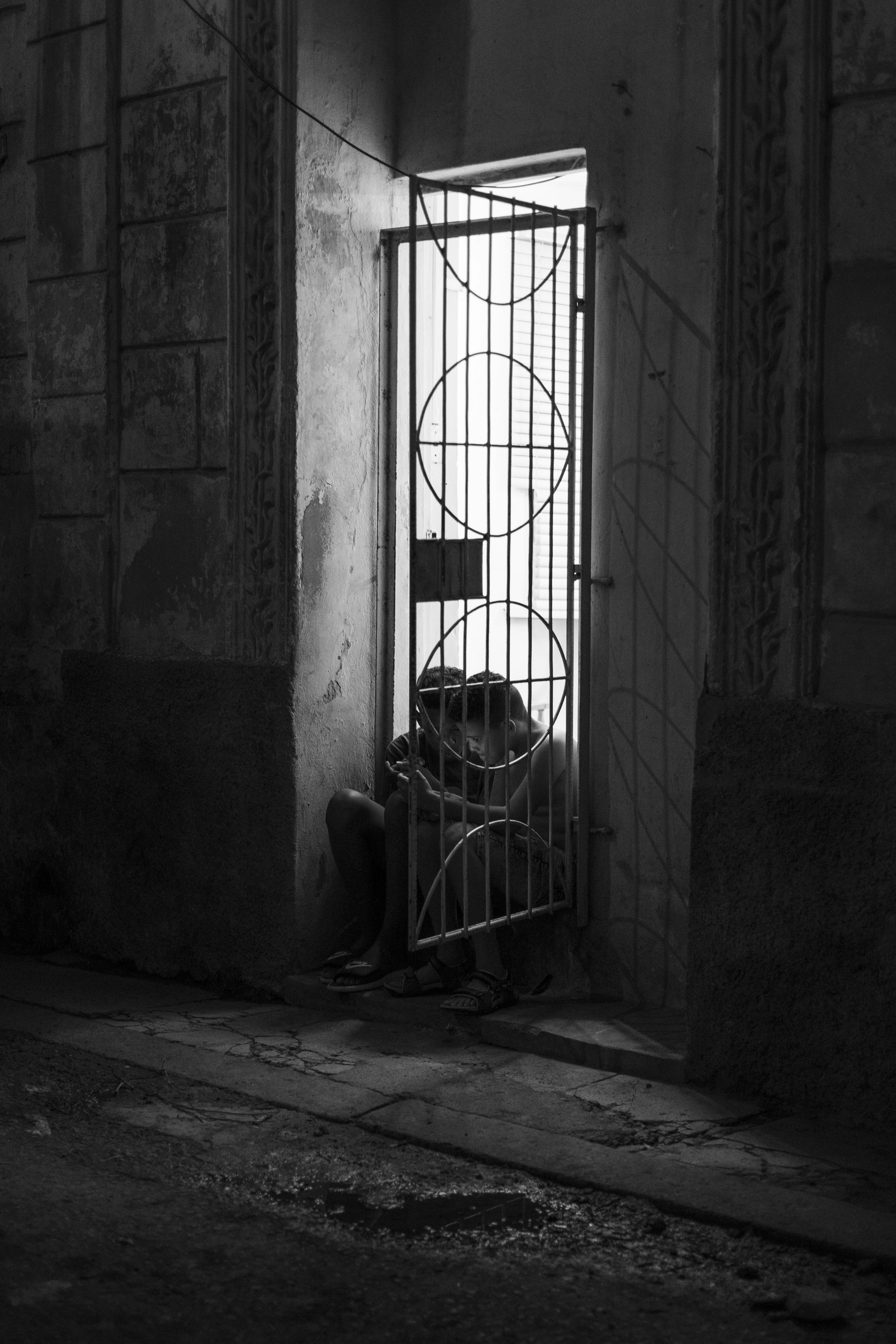 Grayscale photo of metal gate photo – Free Havana Image on Unsplash