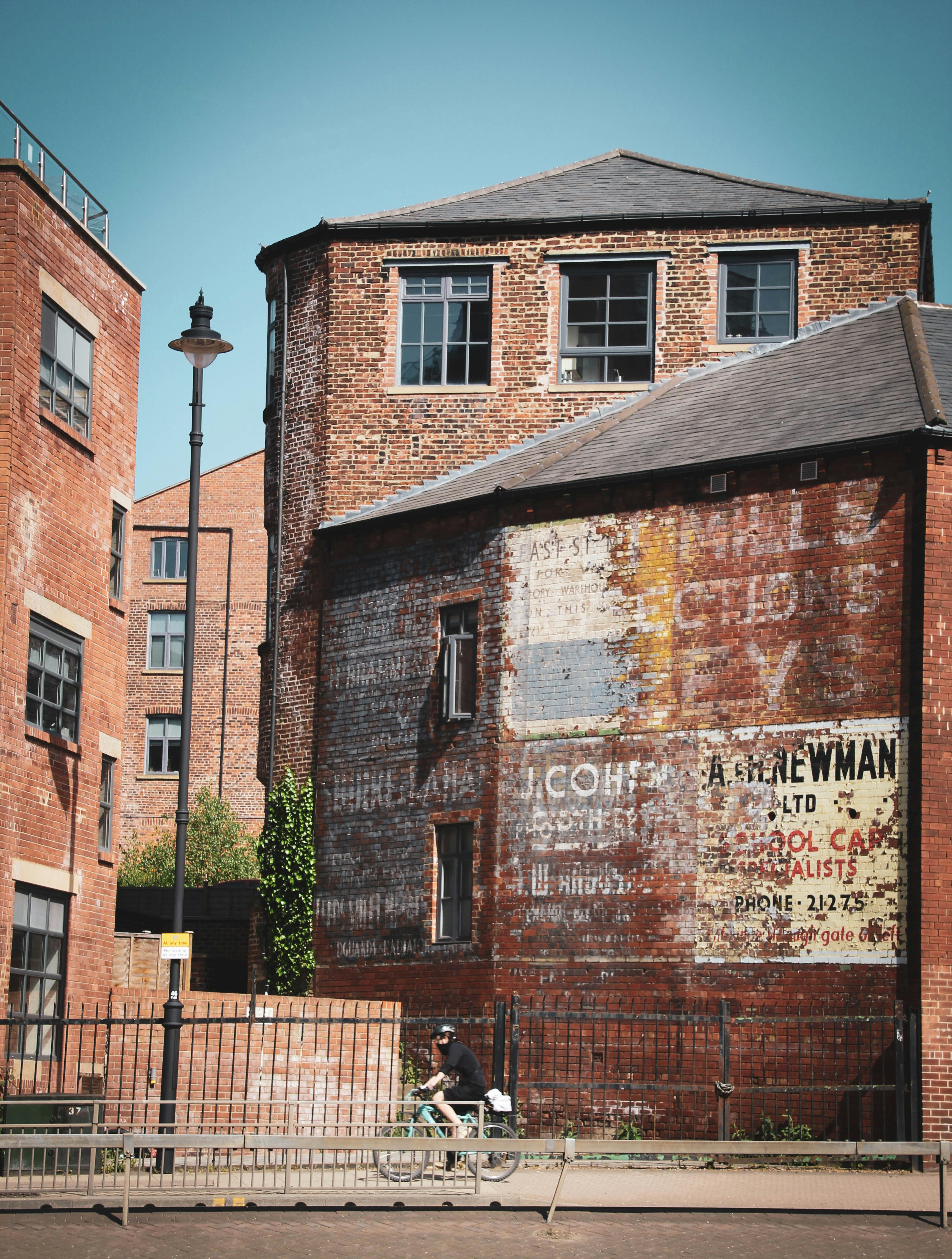 Brown brick building near green trees during daytime photo – Free Leeds ...