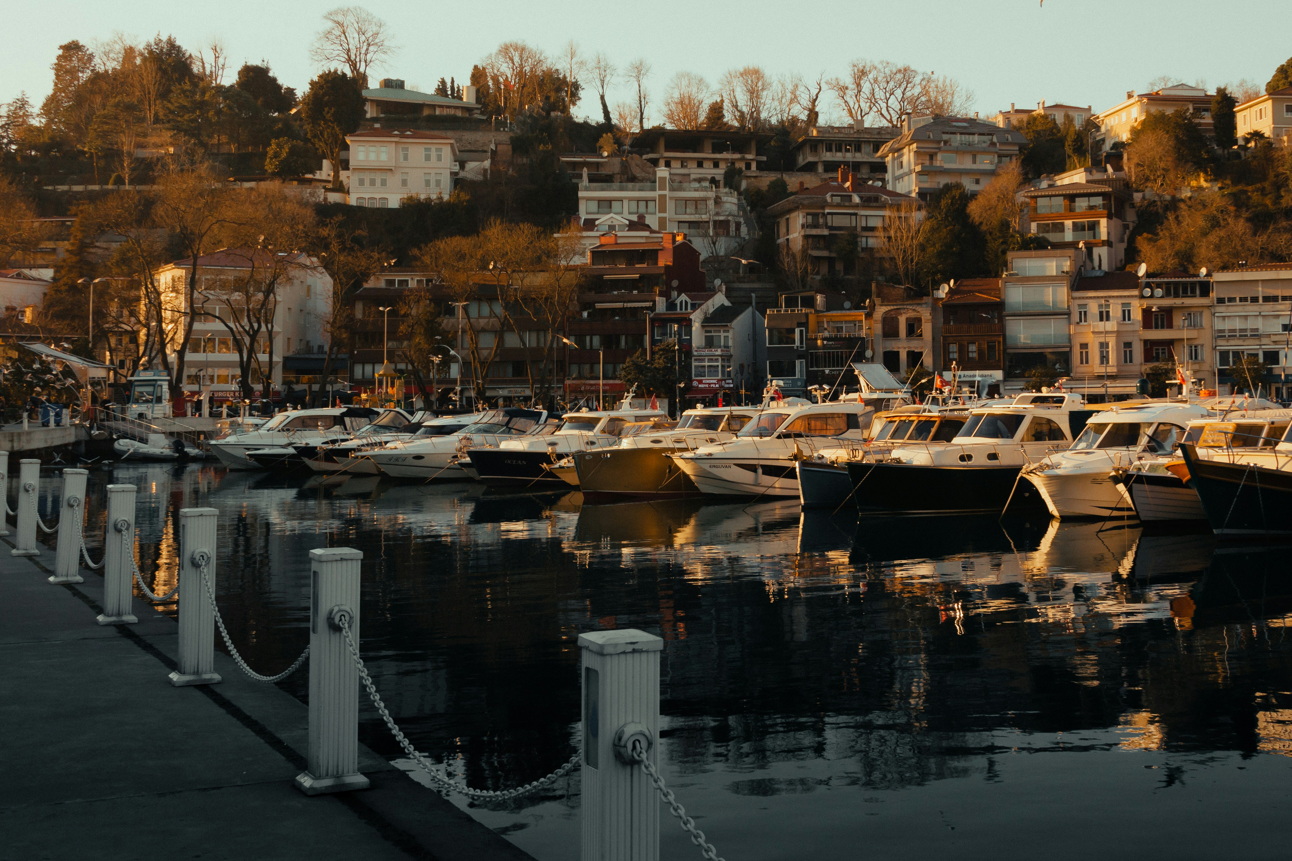 Golden Hour Marina: Yachts Rest Along a Quiet Waterfront