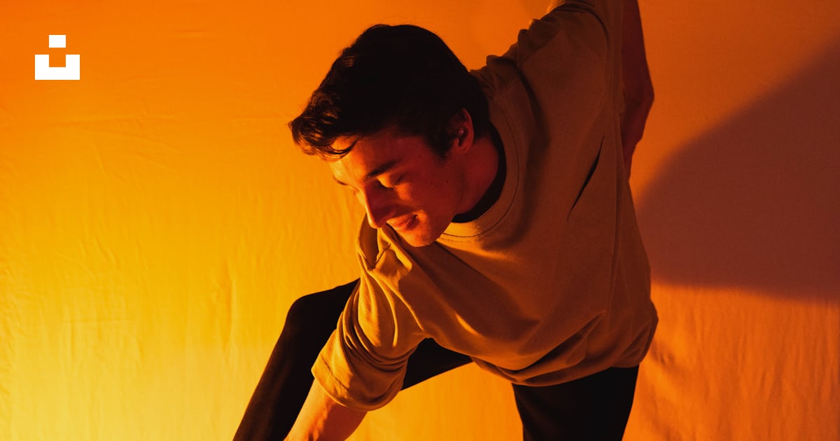 Man In Brown Long Sleeve Shirt And Black Pants Photo Free Dance Pose