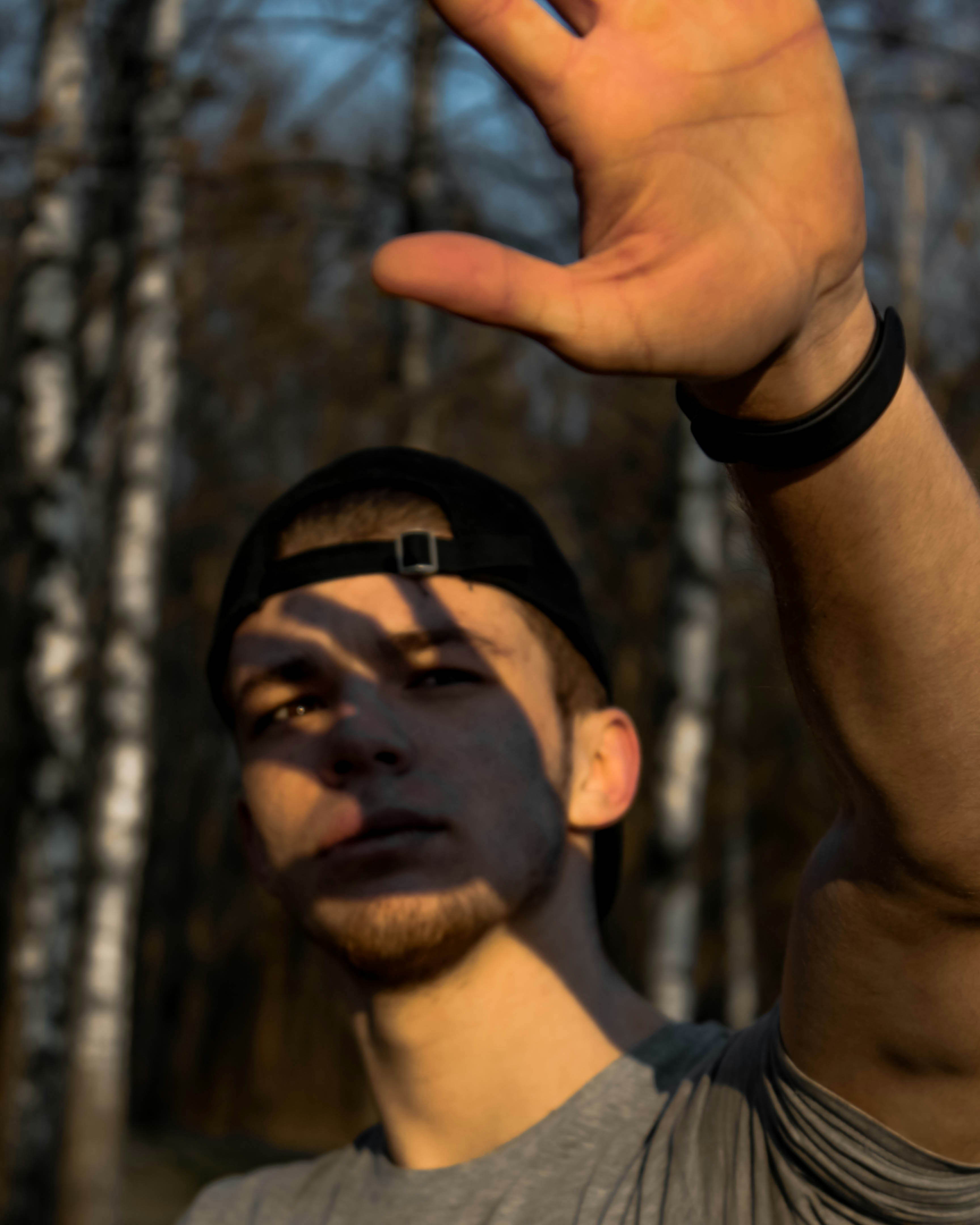 Raised Hand, Rooted in Light: A Birch Forest Self-Portrait