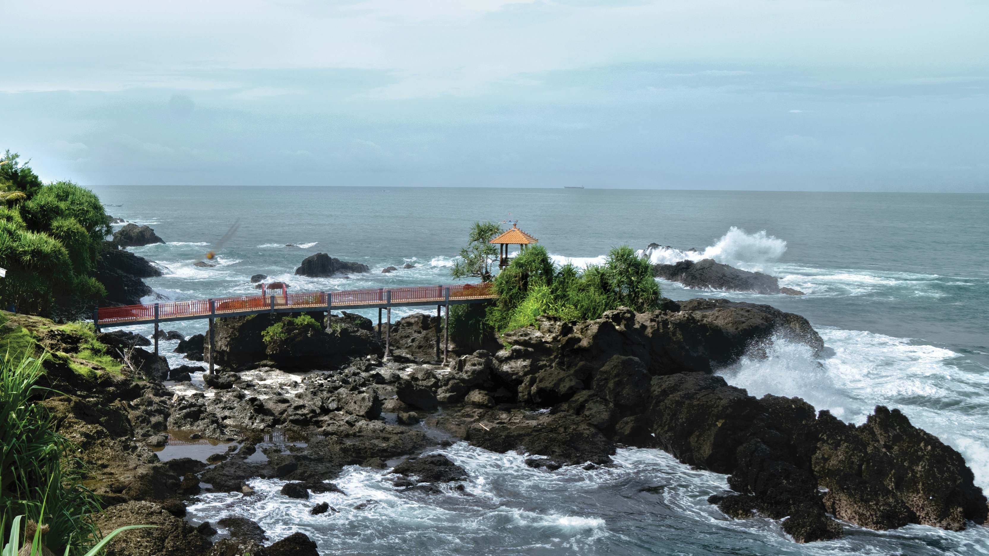 Gazebo on the Rocks: A Bridge to the Ocean's Edge