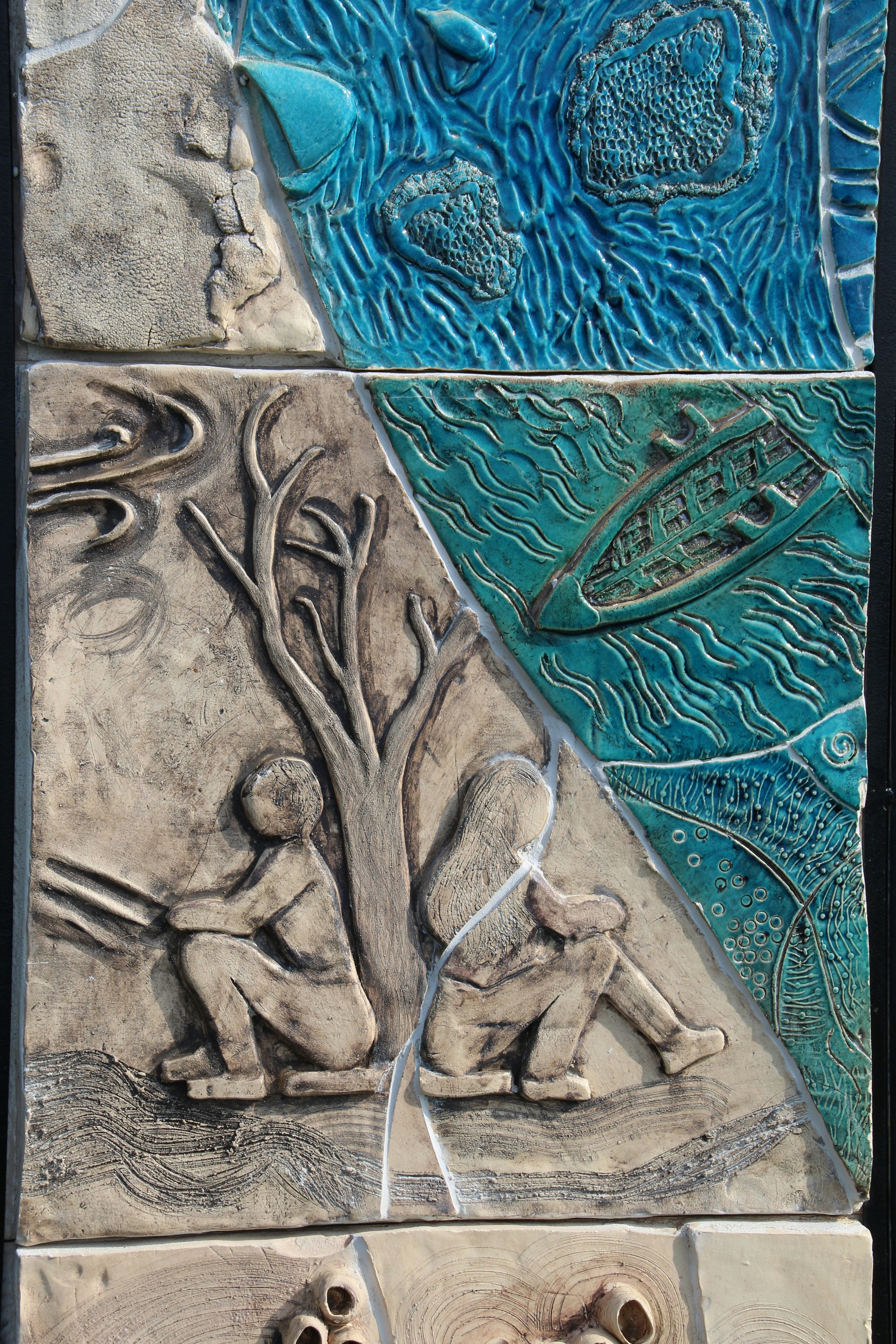 Seated Figures Beneath a Tree: Ceramic Relief in Color-Block Tiles