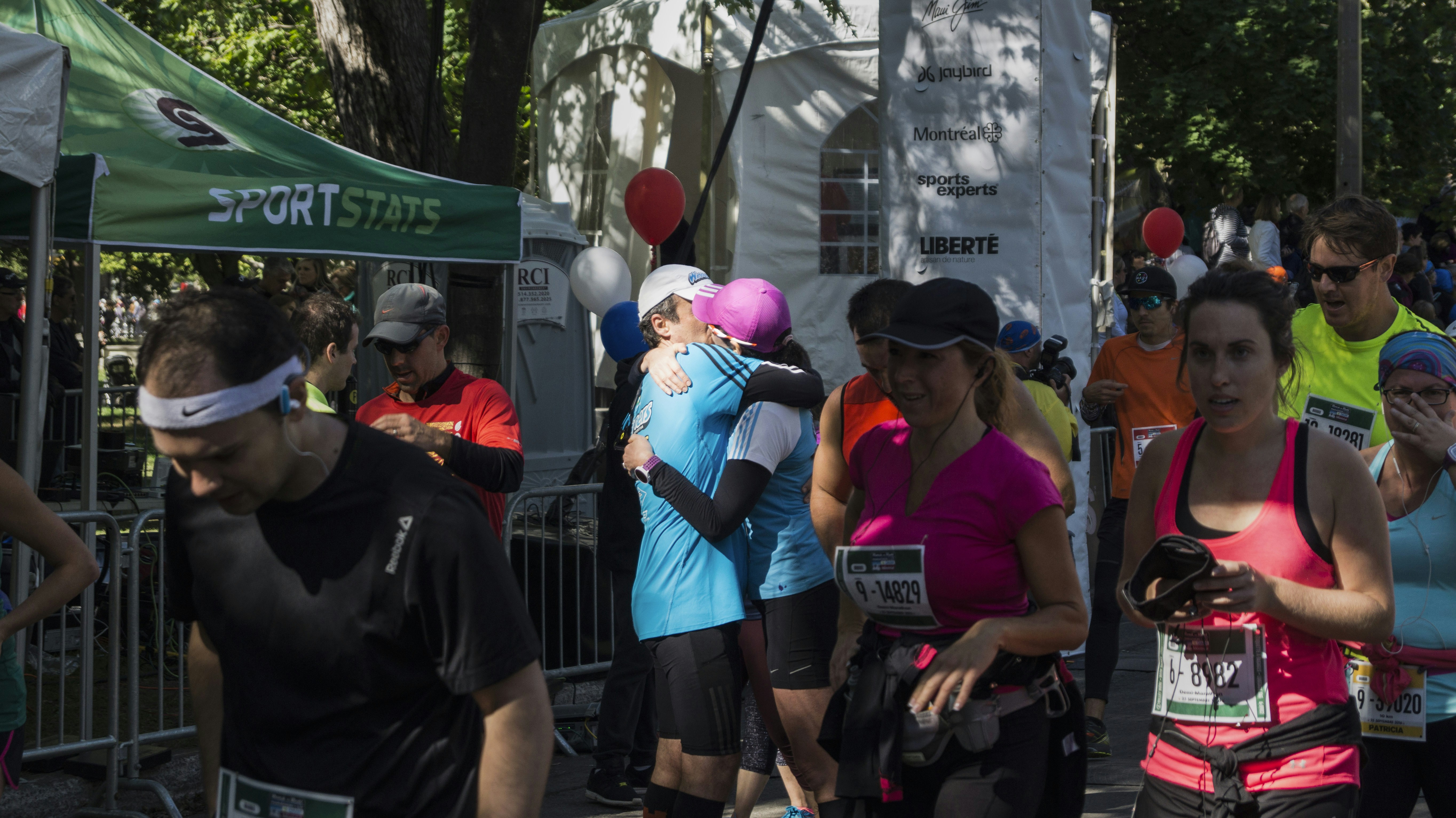Finish Line Embrace: Marathon Crowds Rally at the City Run