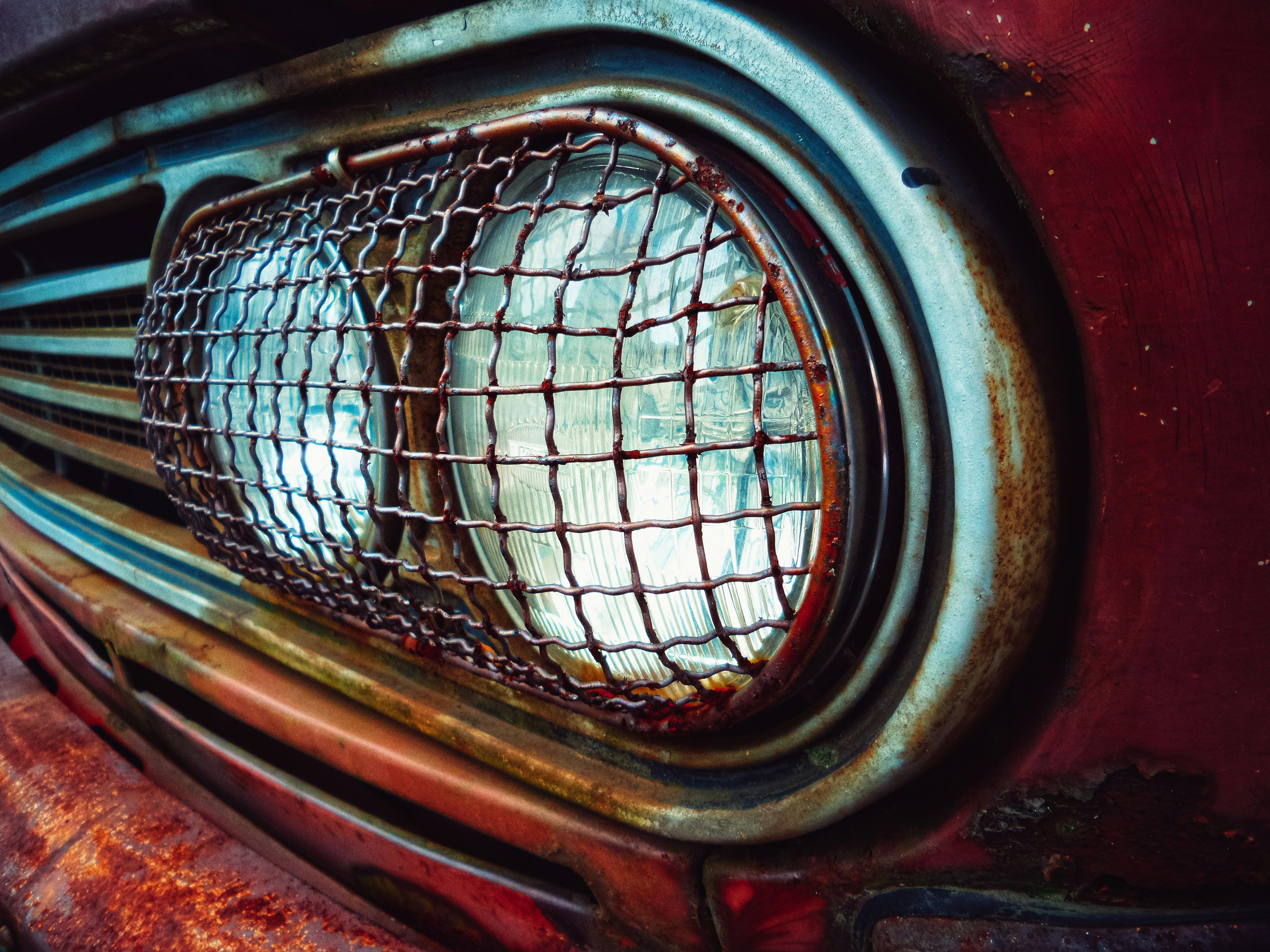 Rust and Radiance: A Grille-Guarded Headlamp Glare