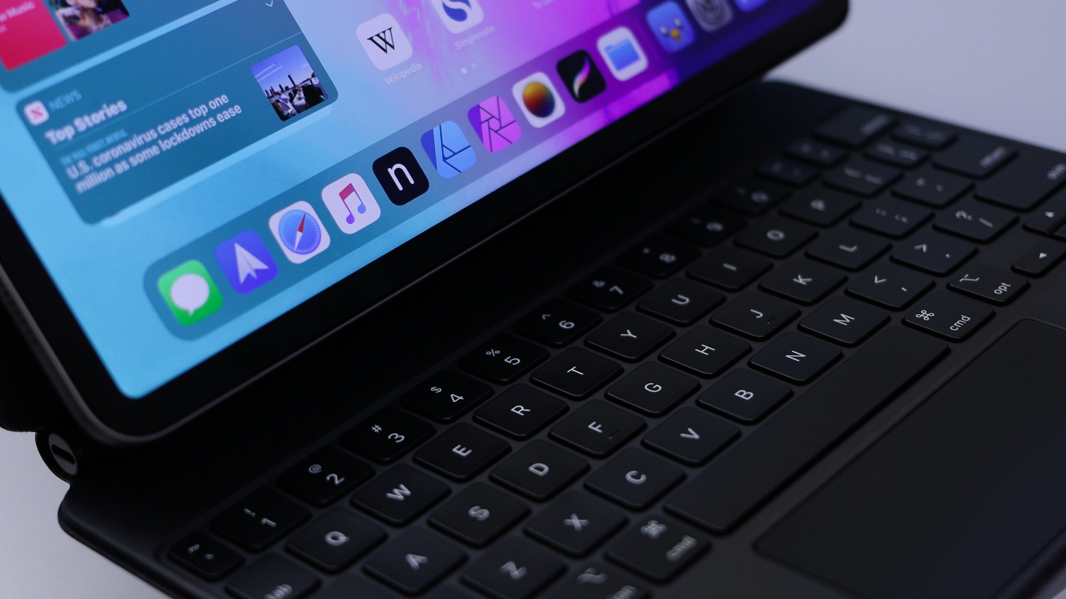 Black laptop computer turned on displaying icons photo – Free ...