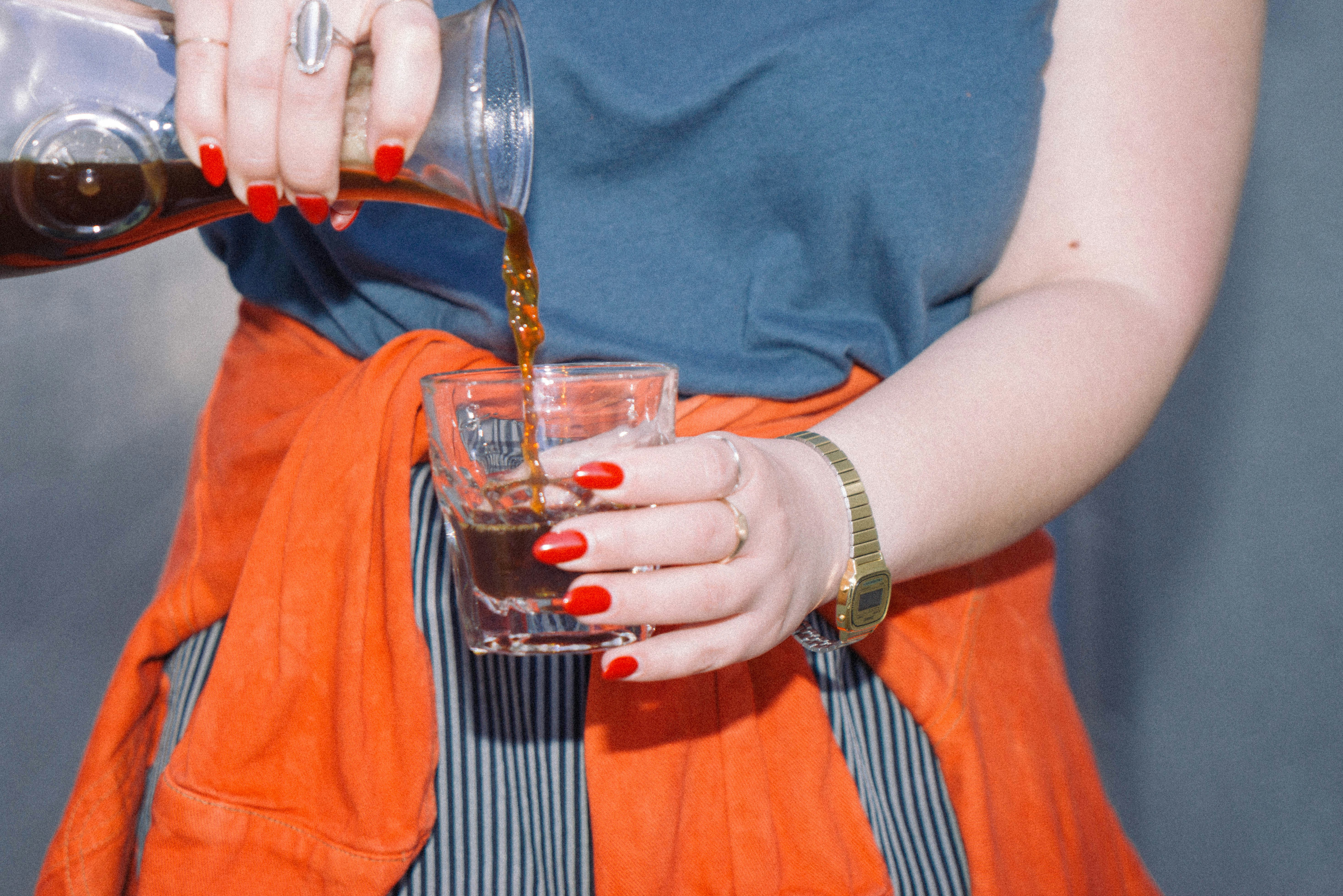 Amber Pour at Waist-Level: A Moment of Color and Motion