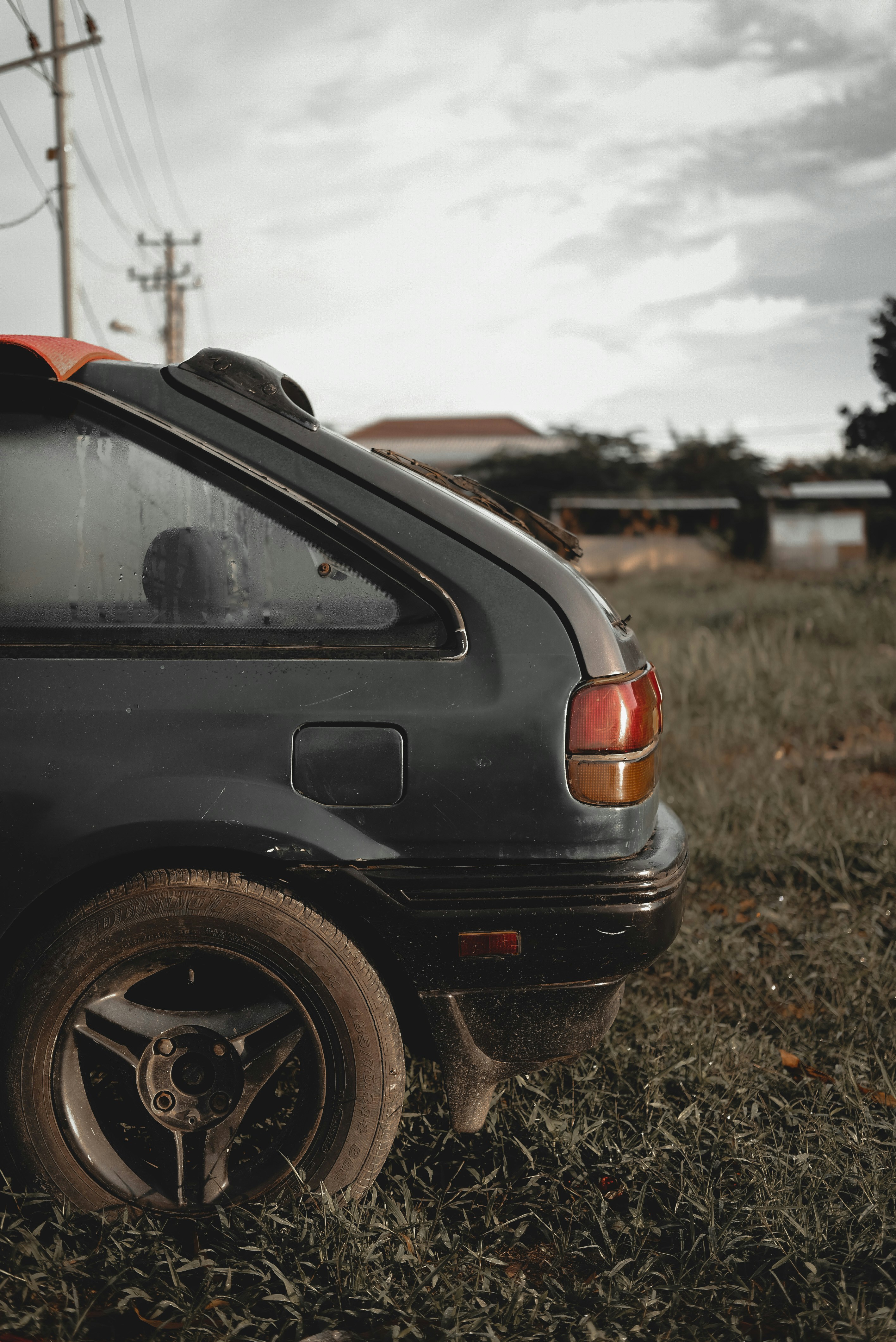 Forgotten Hatchback in the Field at Dusk