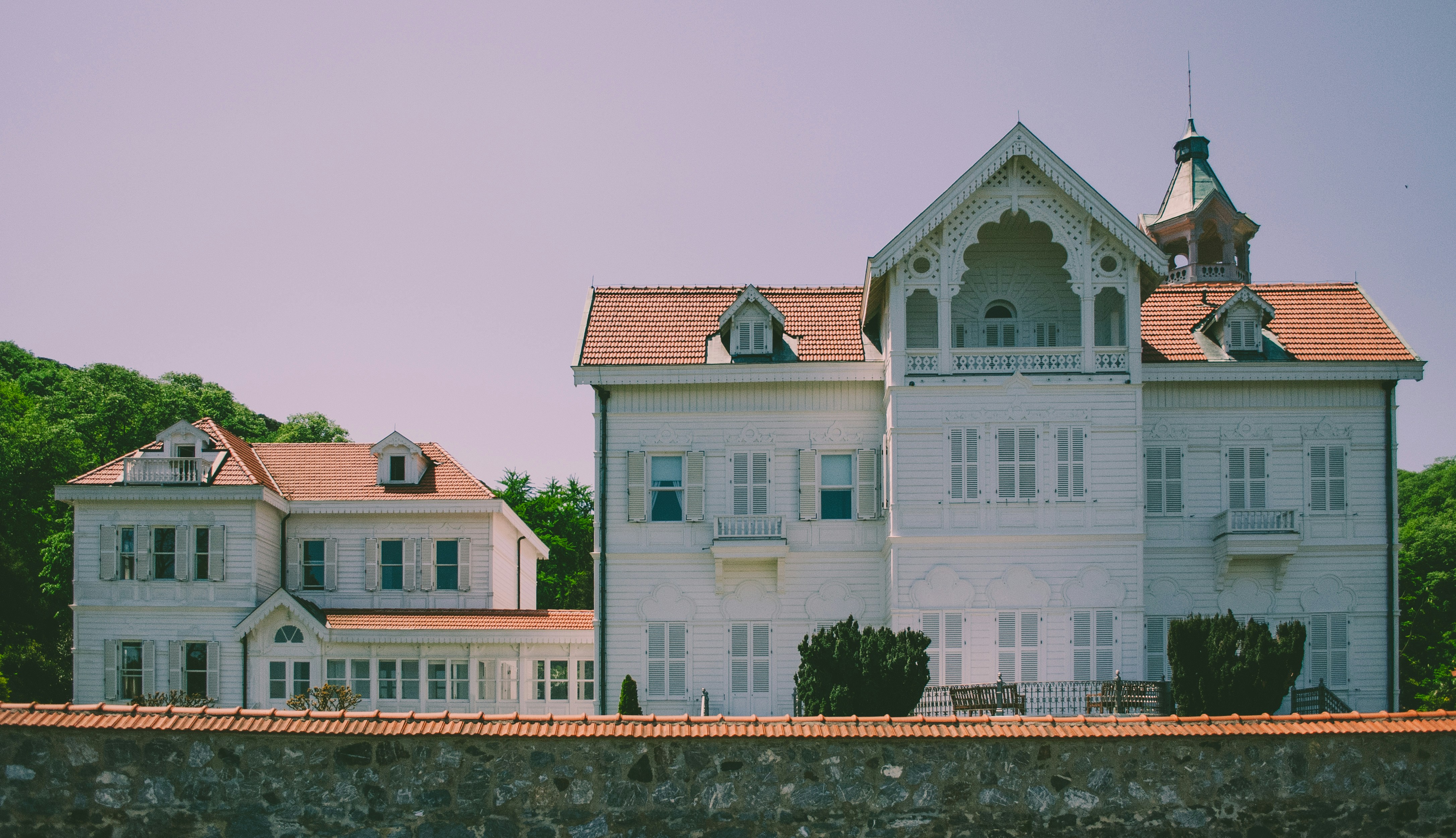Ornate Gable Manor under a Blush Sky