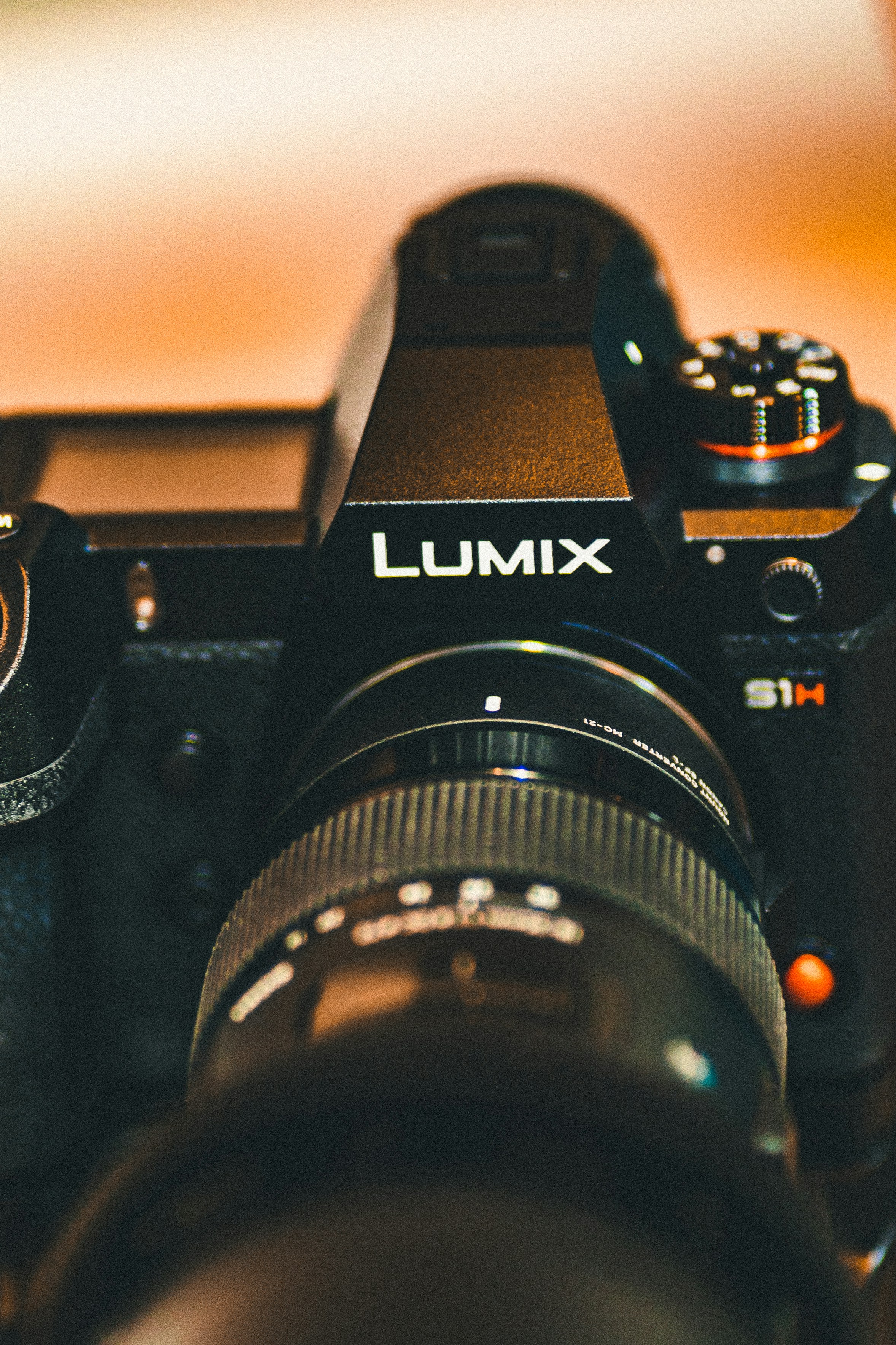 Black nikon dslr camera on brown wooden table photo – Free Lumix camera ...