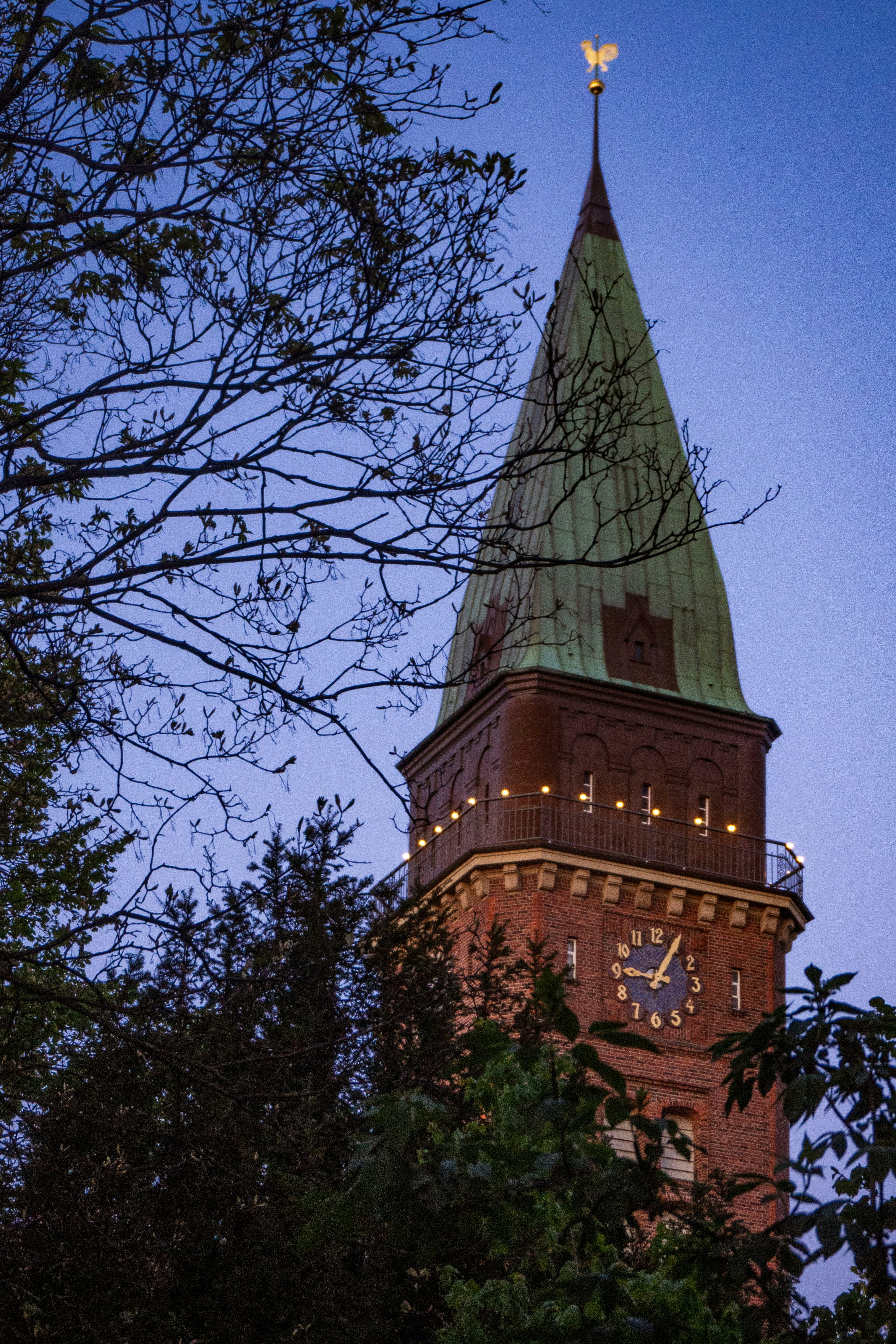 Stalwart Clock Tower Spire Beneath Dusky Sky