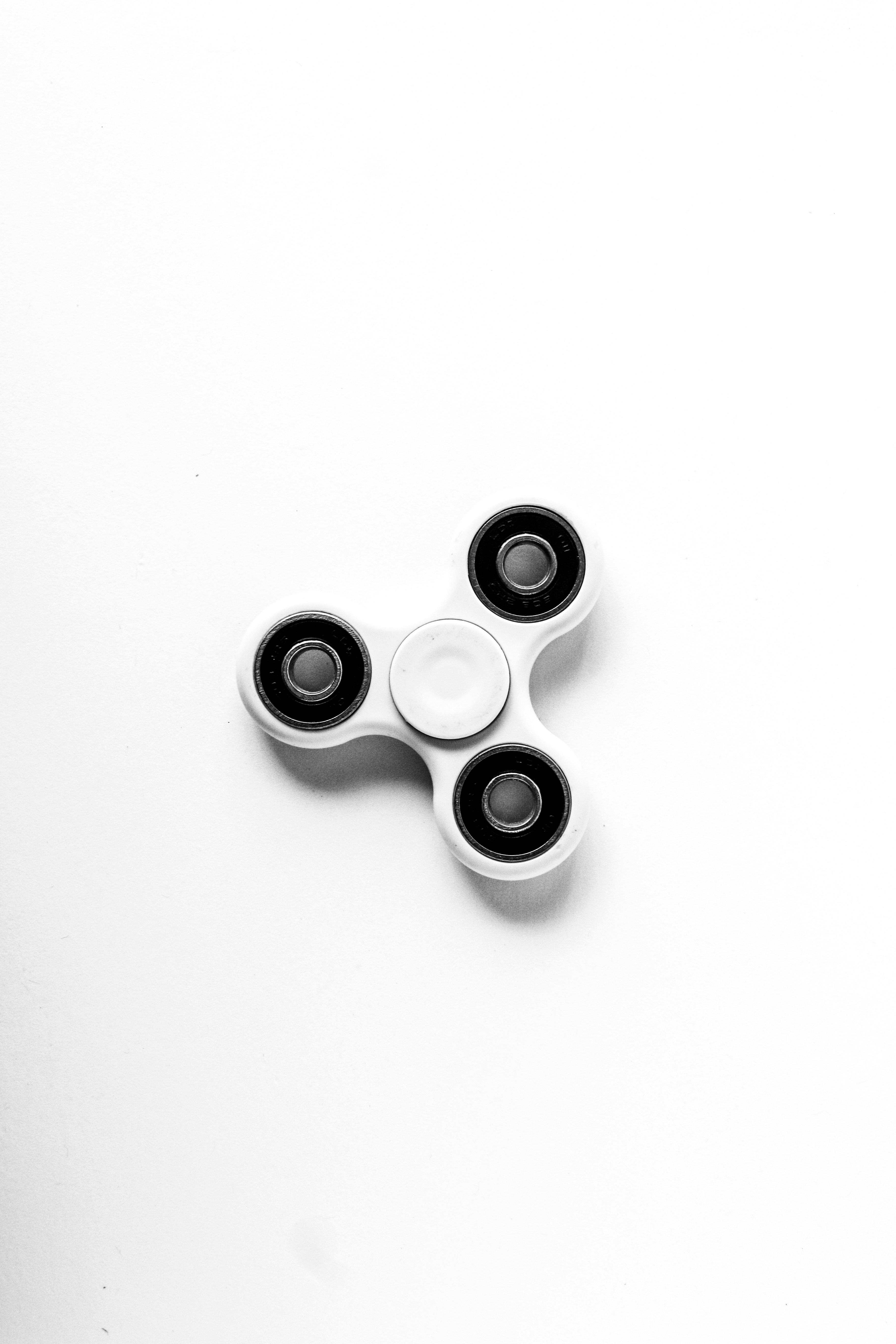 White 3 blade spinner on white surface photo – Free Grey Image on Unsplash