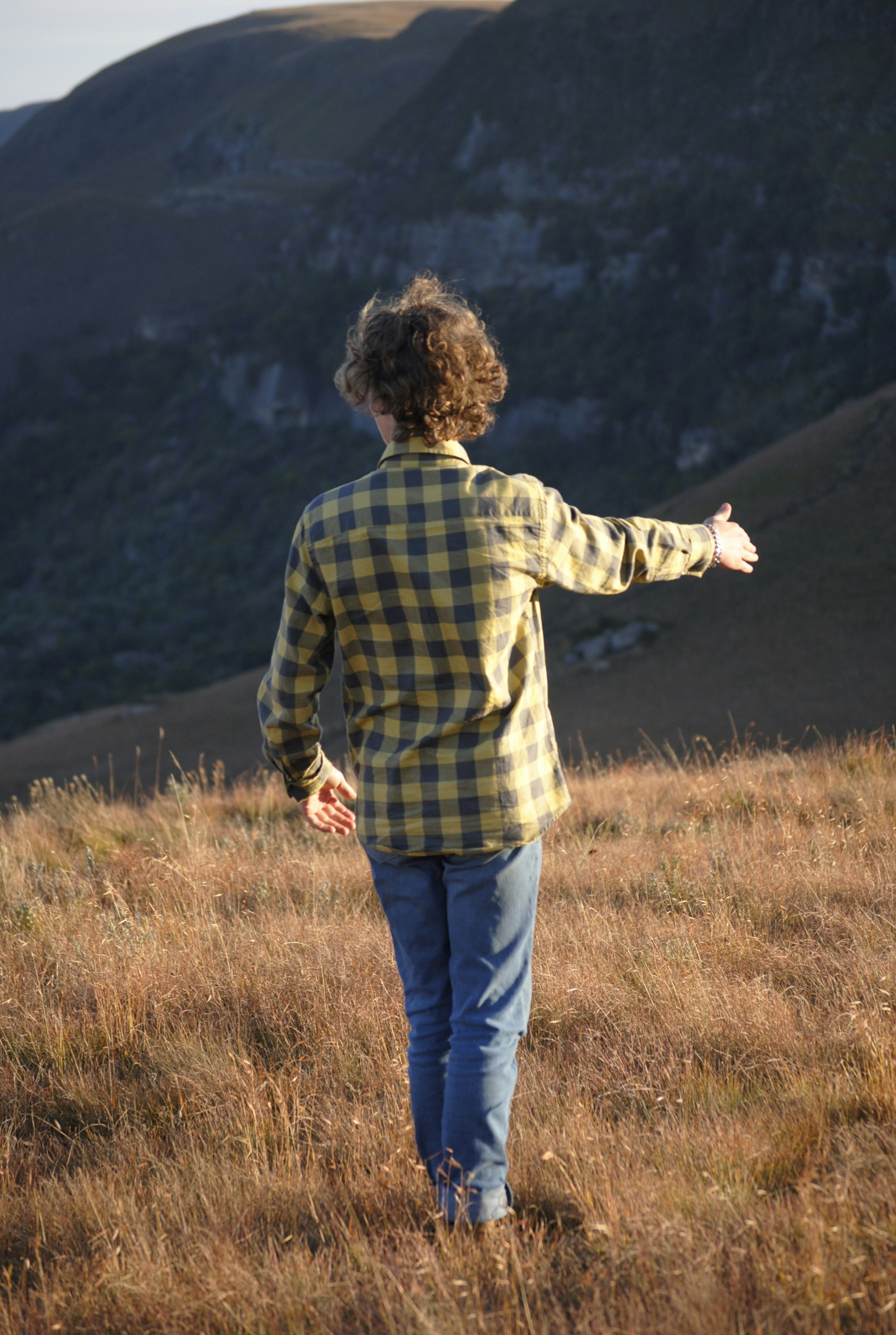 Outstretched on the Ridge: a sunlit hillside moment