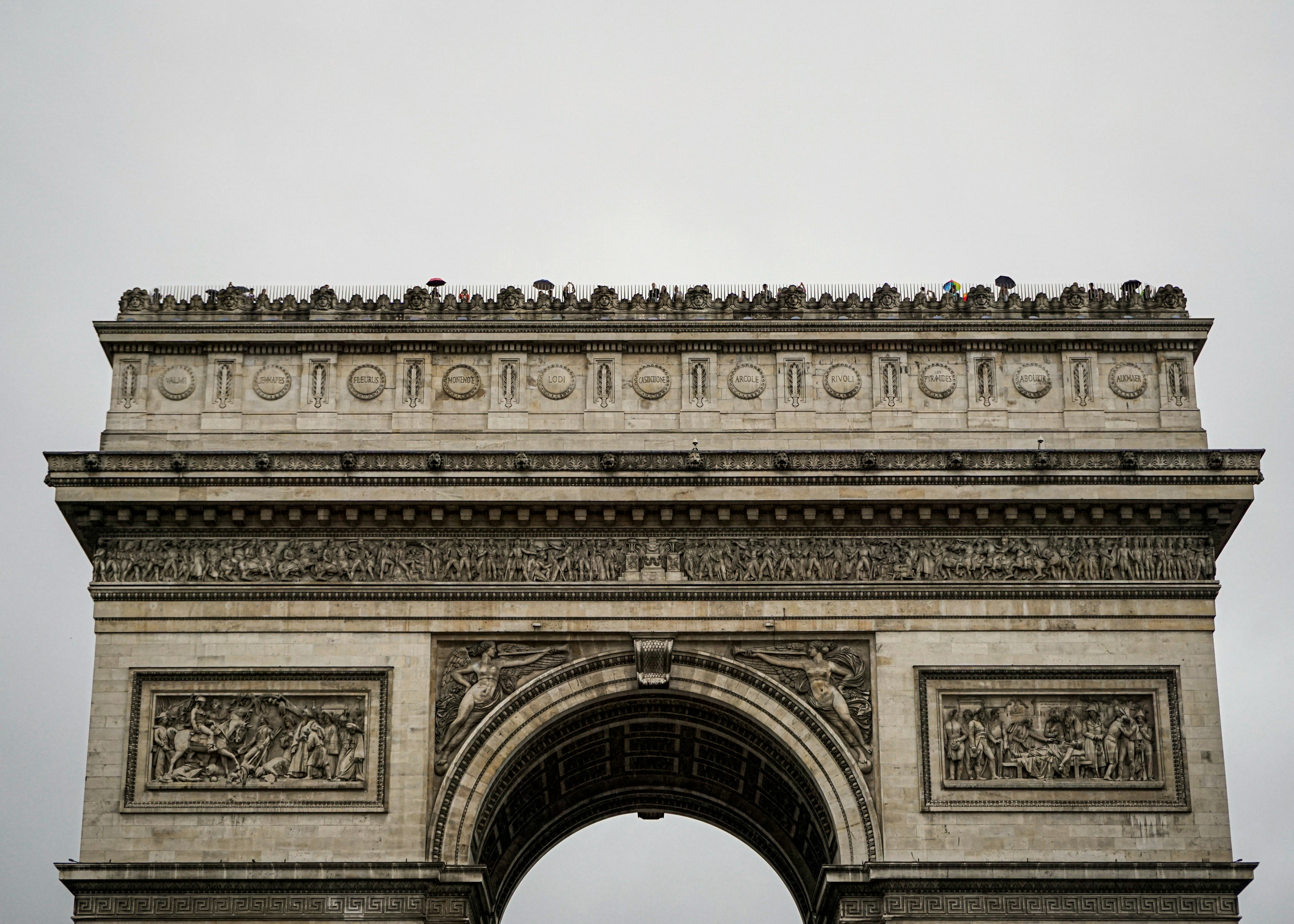 Crowds Along the Crest of Paris's Arc de Triomphe