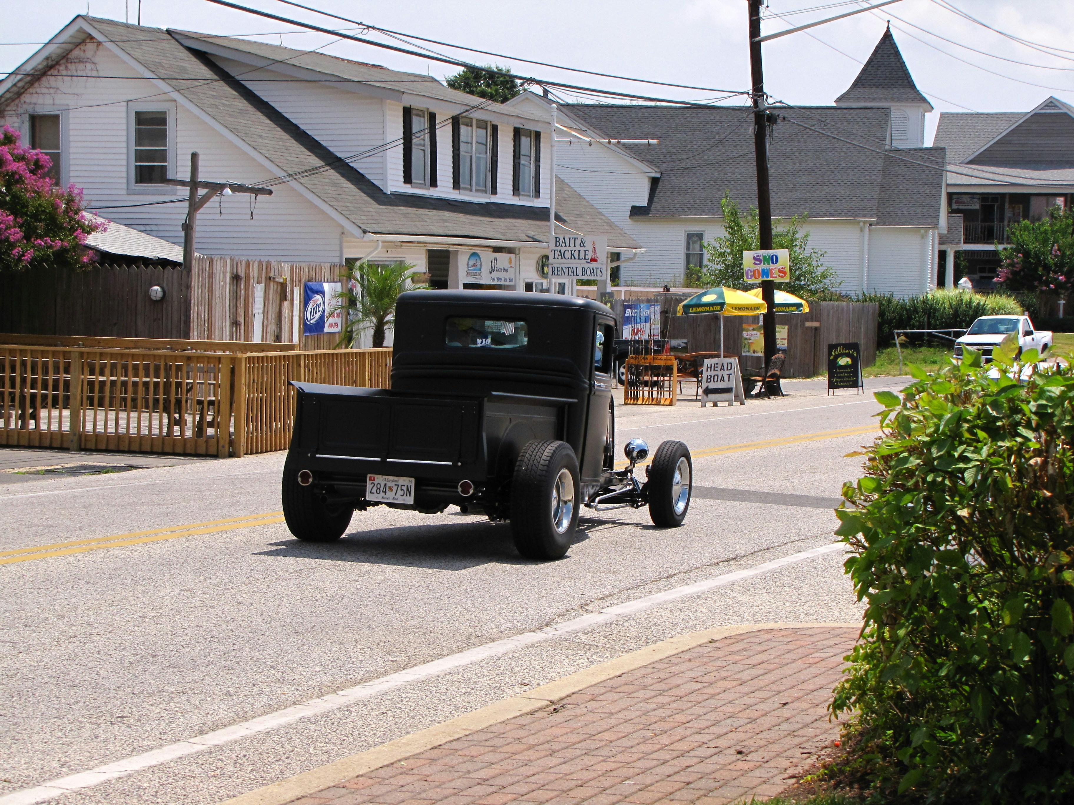 Black single cab pickup truck parked on road side during daytime photo ...