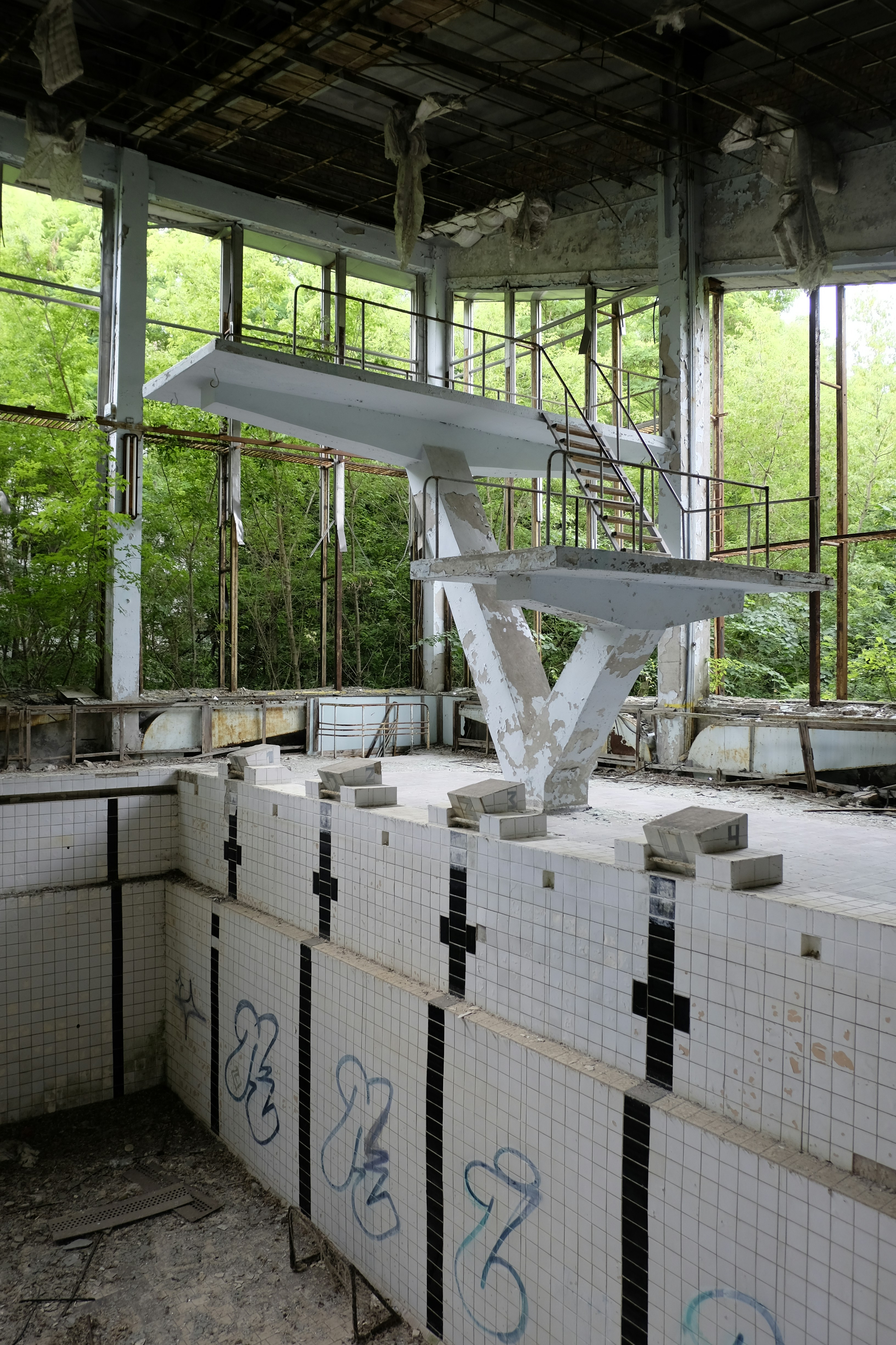Empty swimming pool. Chernobyl Exclusion Zone | white concrete blocks on white concrete floor