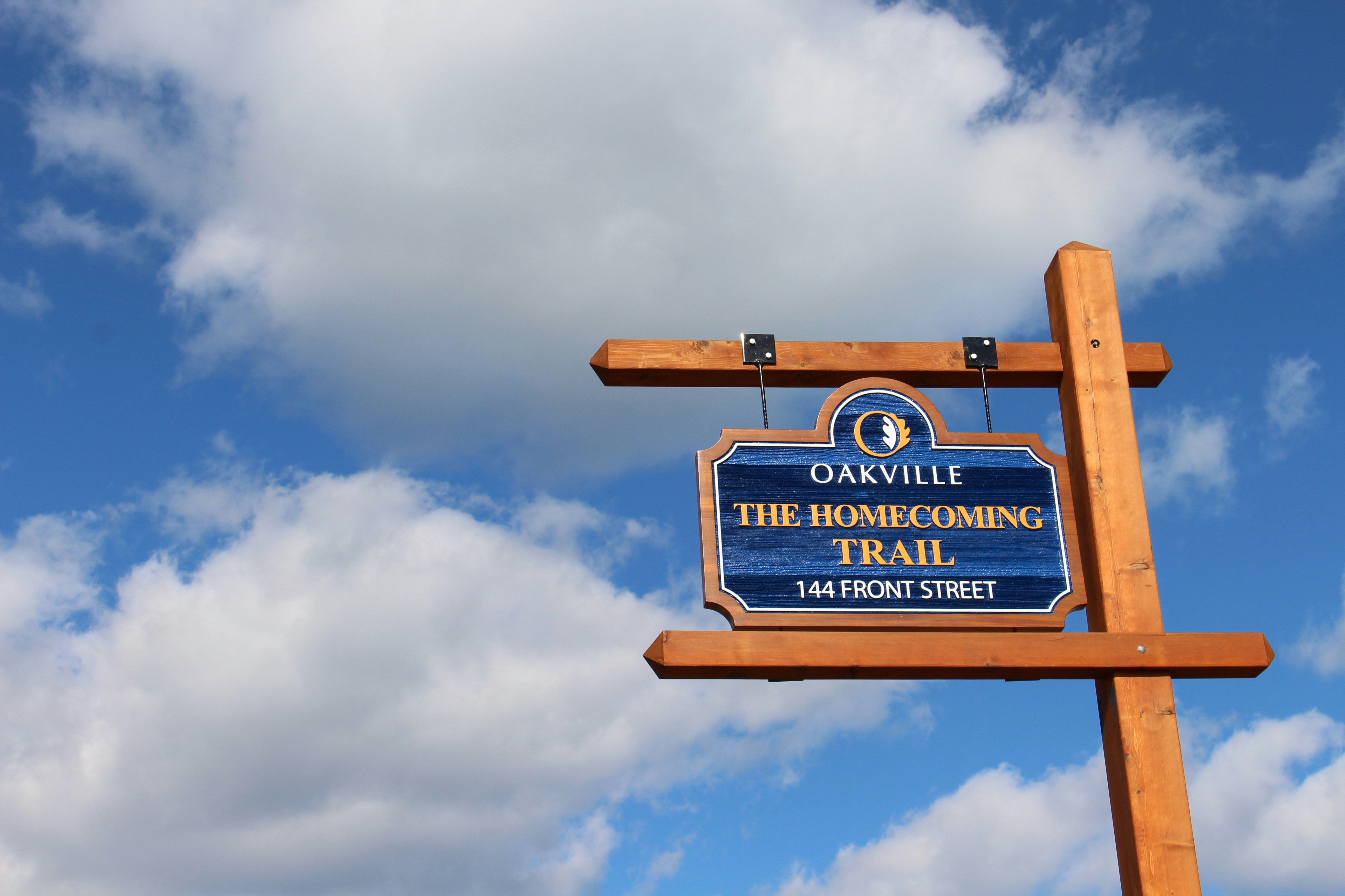 Brown wooden signage under cloudy sky during daytime photo – Free Sign ...