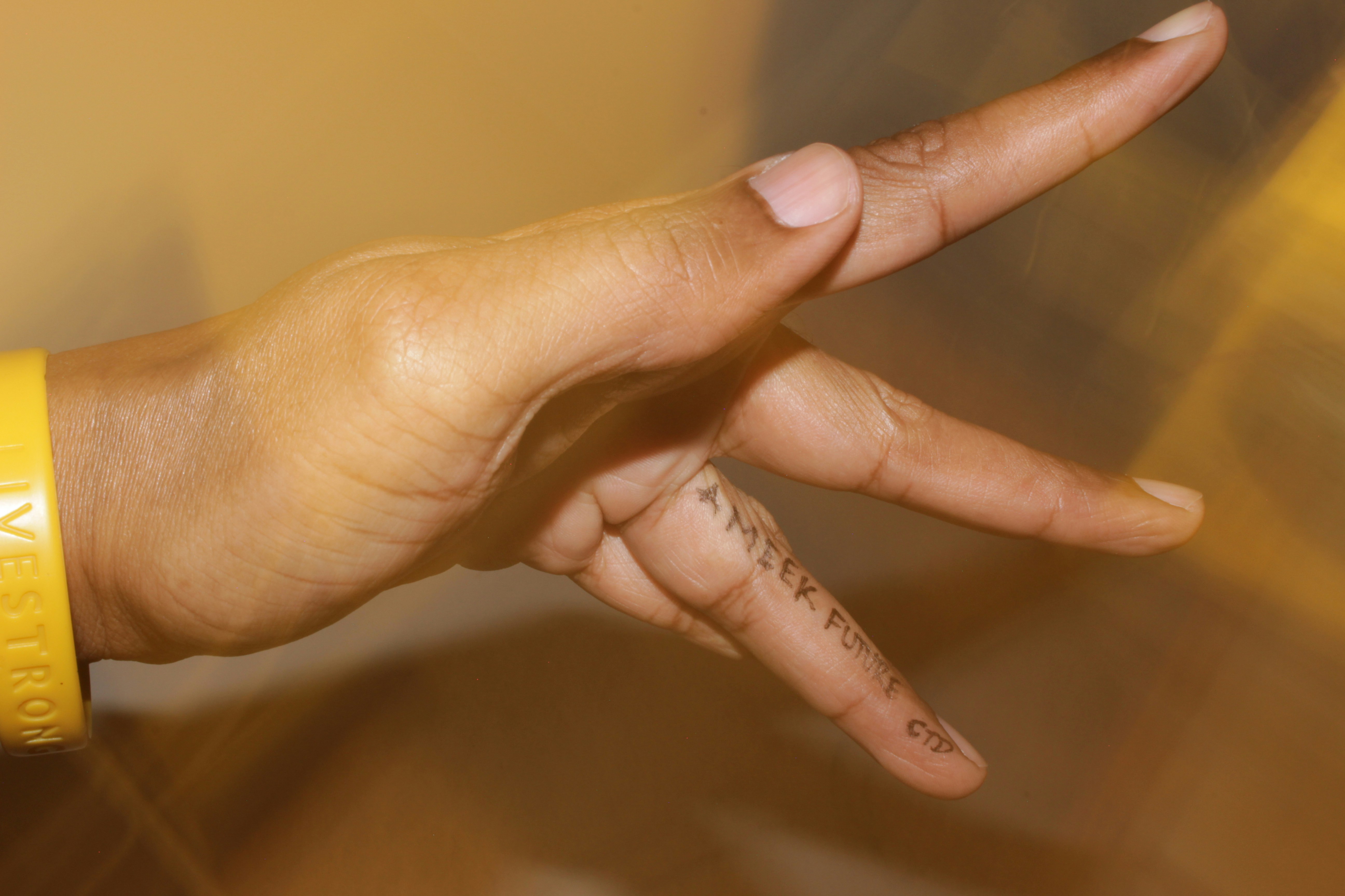 Touch of Time: Clasped Fingers in Warm Light