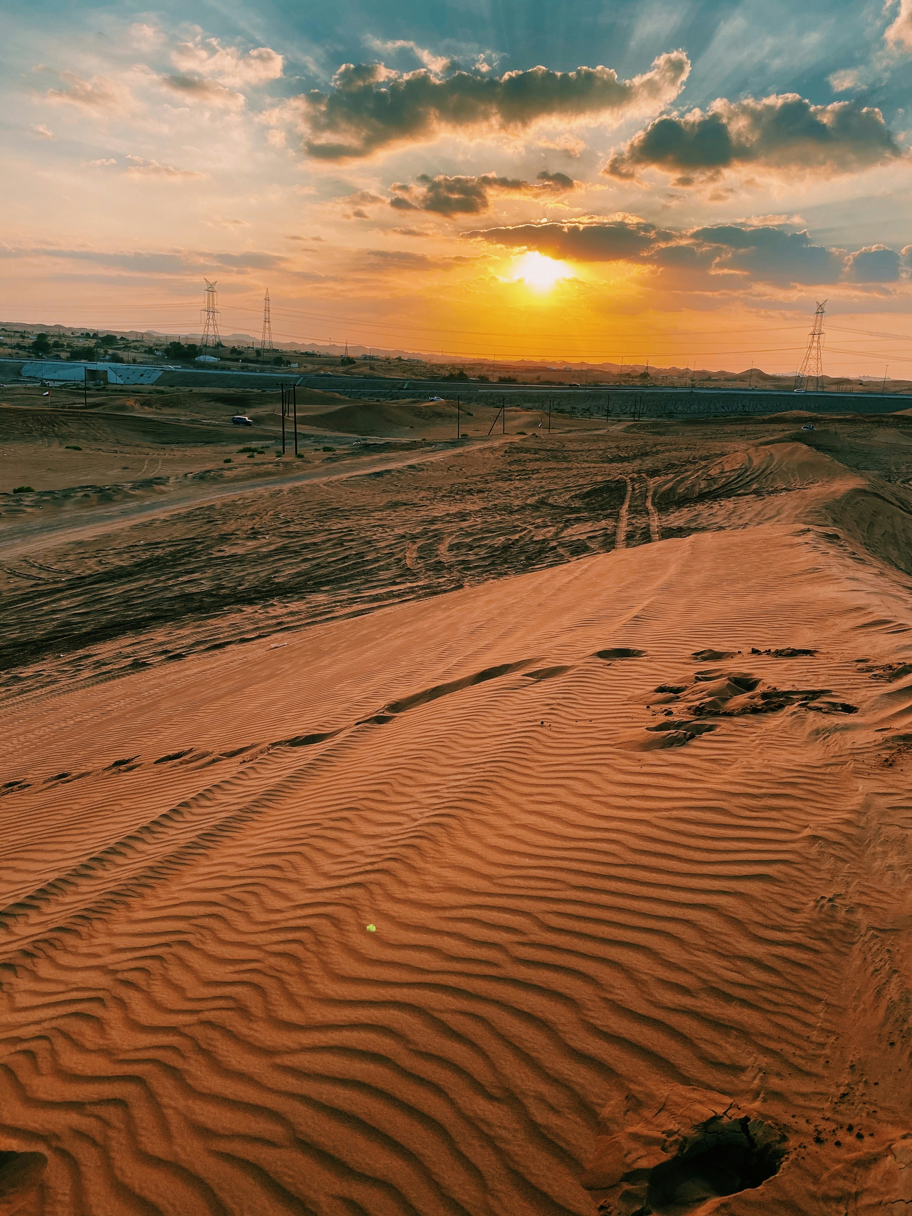 Brown sand field during sunset photo – Free Soil Image on Unsplash