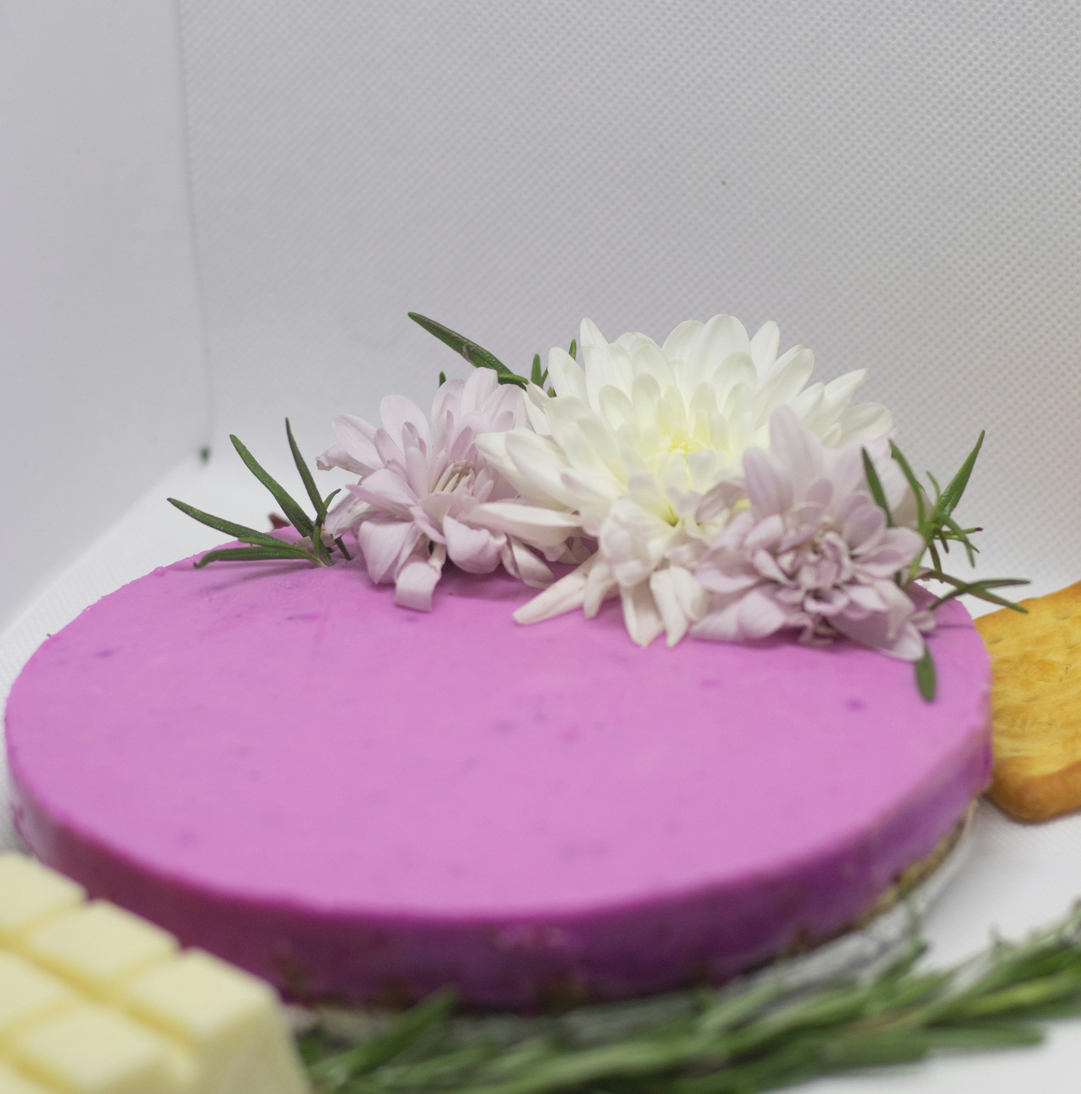 dragonfruit cheesecake with rosemary and dahlia