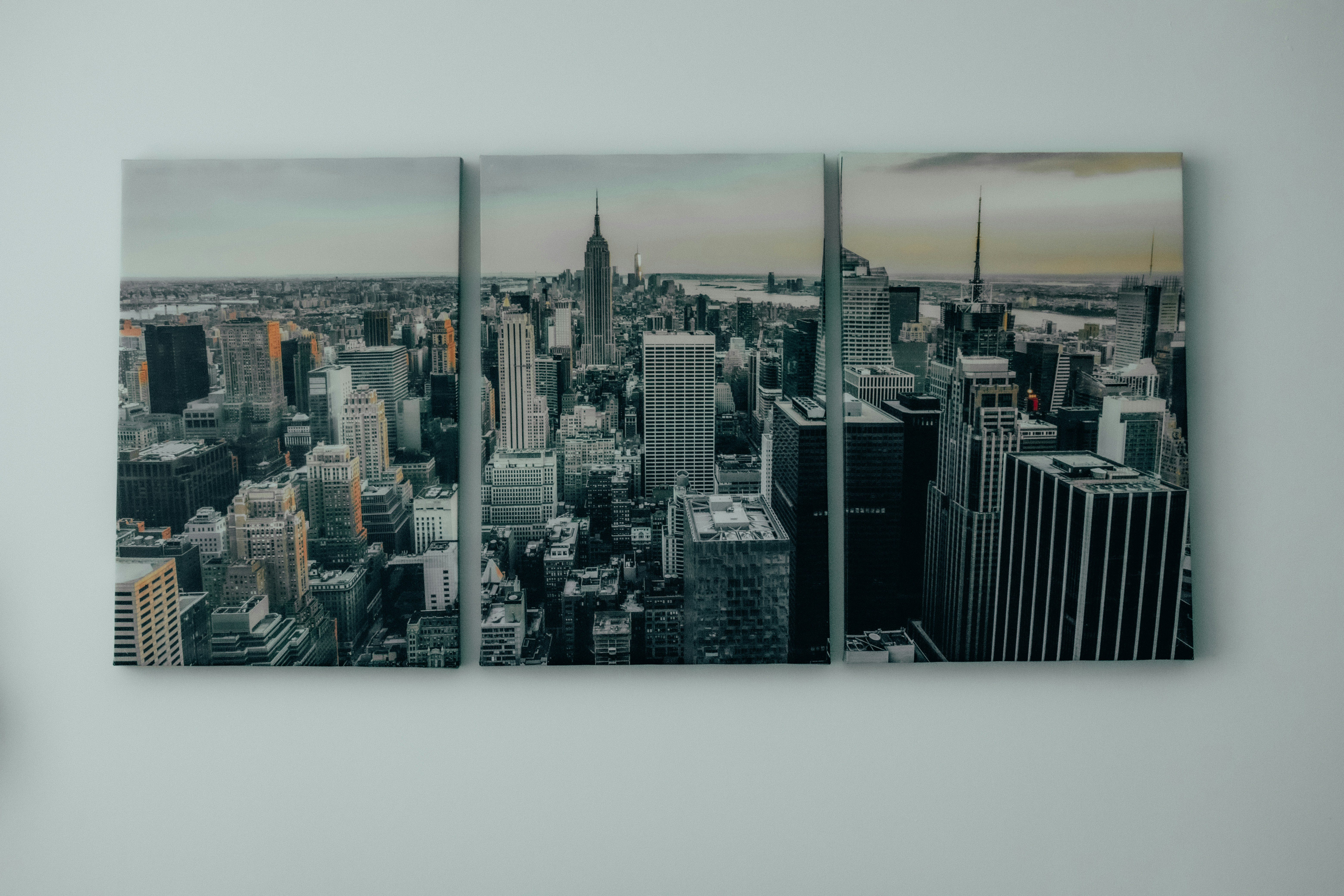 Metropolis in Mosaic: A Triptych Cityscape Under Soft Light