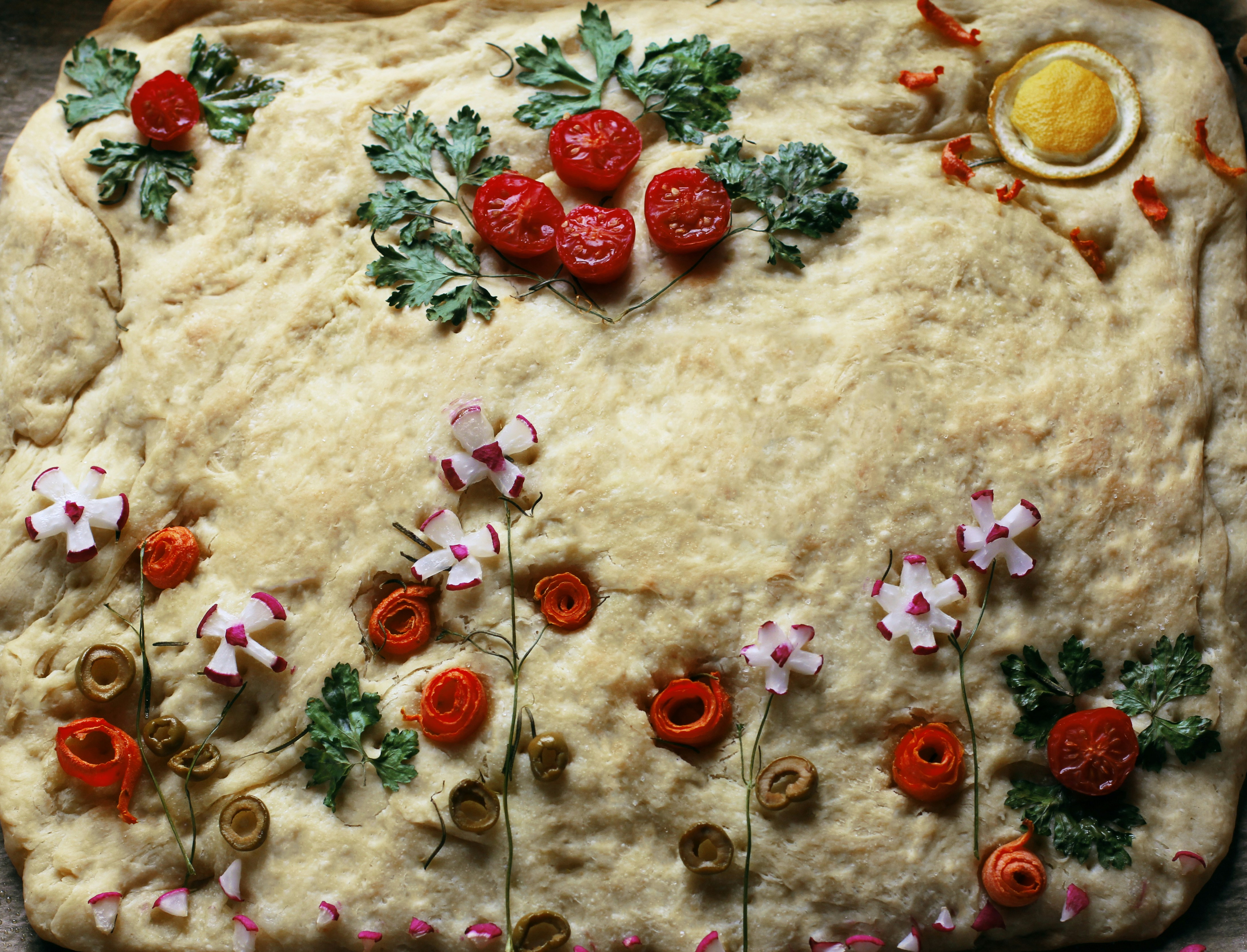red and white flowers on white textile