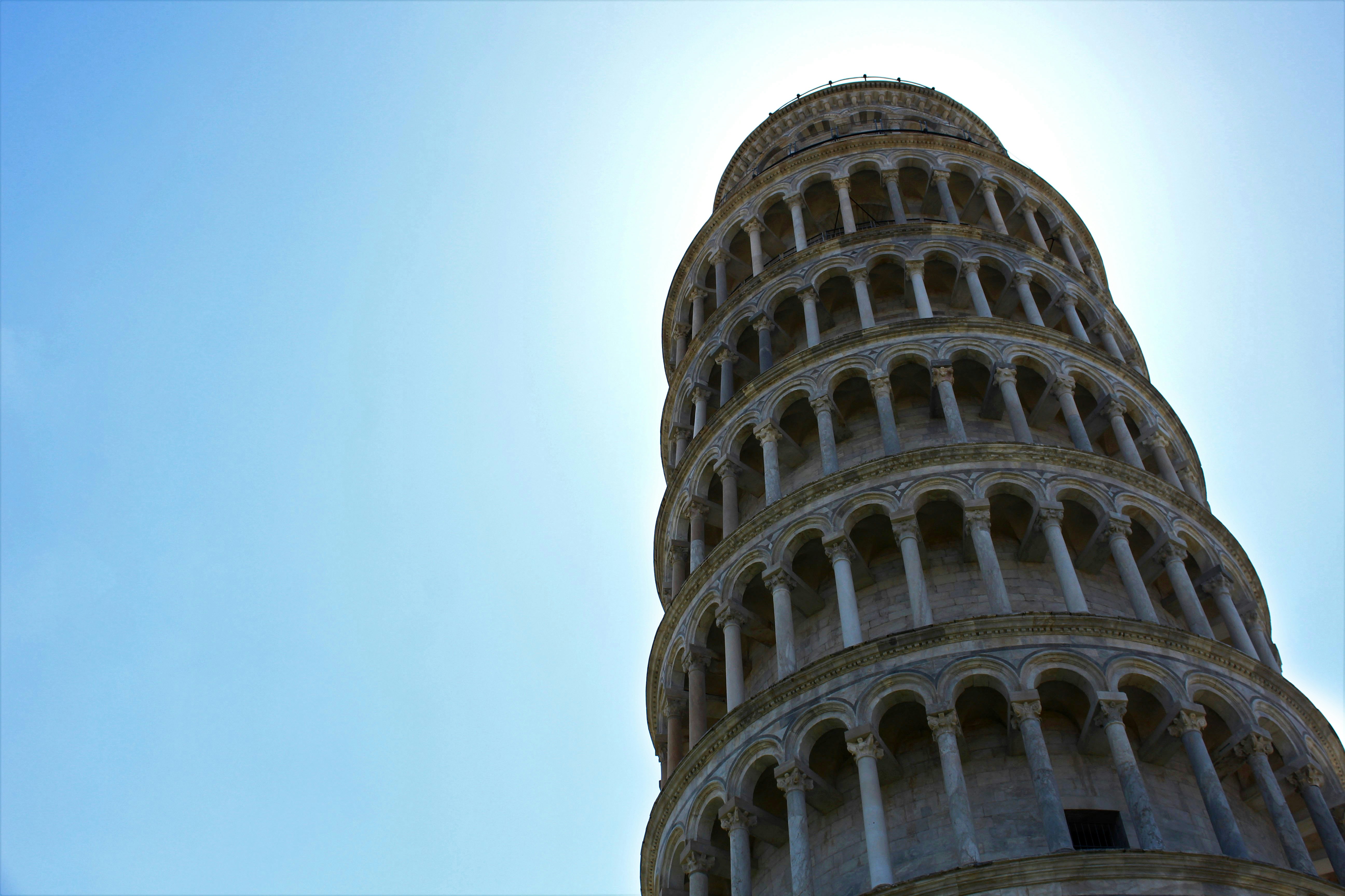 Leaned Bell Tower Against a Halo of Sky